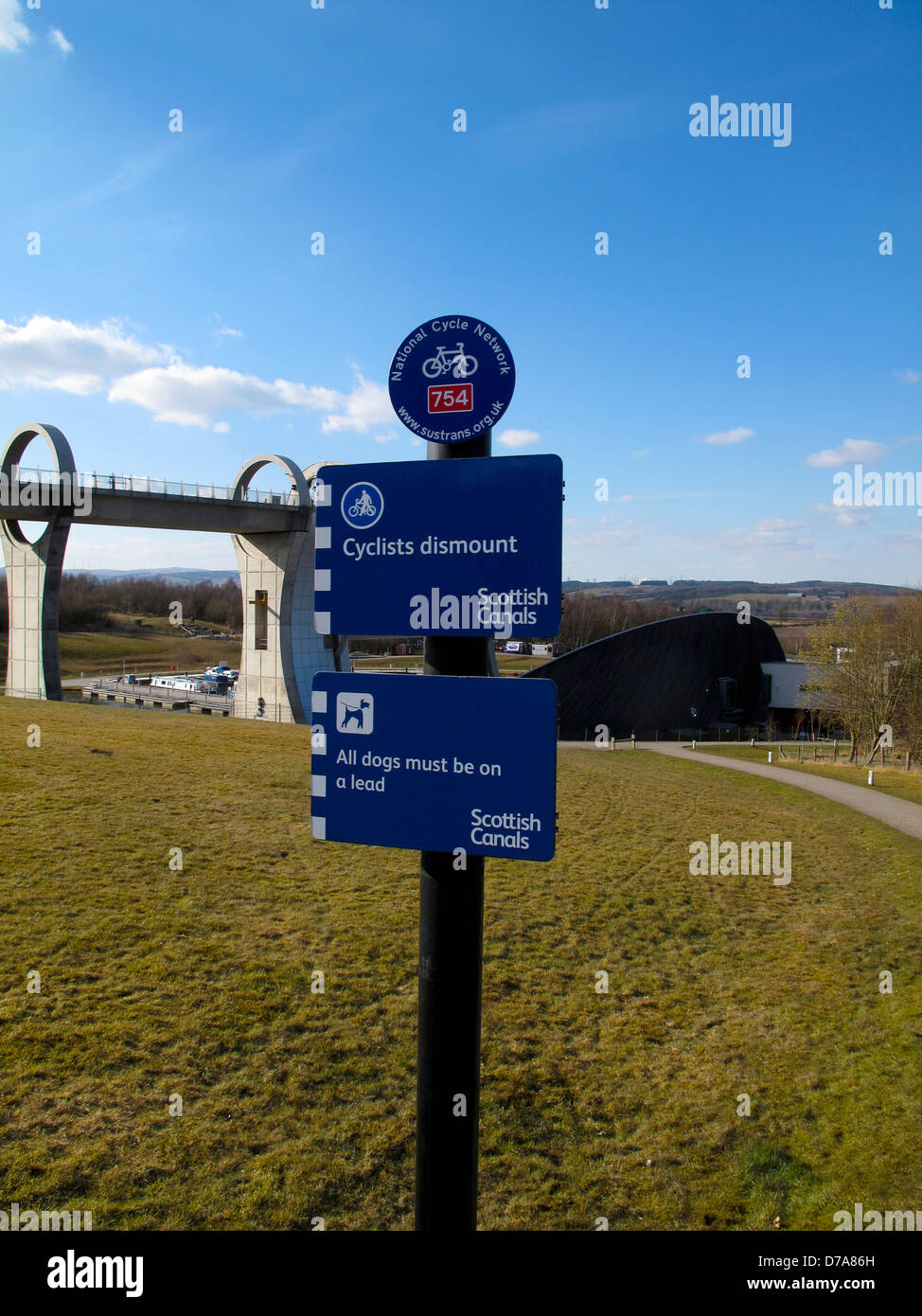 Cyclists dismount sign on sustrans cycle network path at Falkirk wheel ...