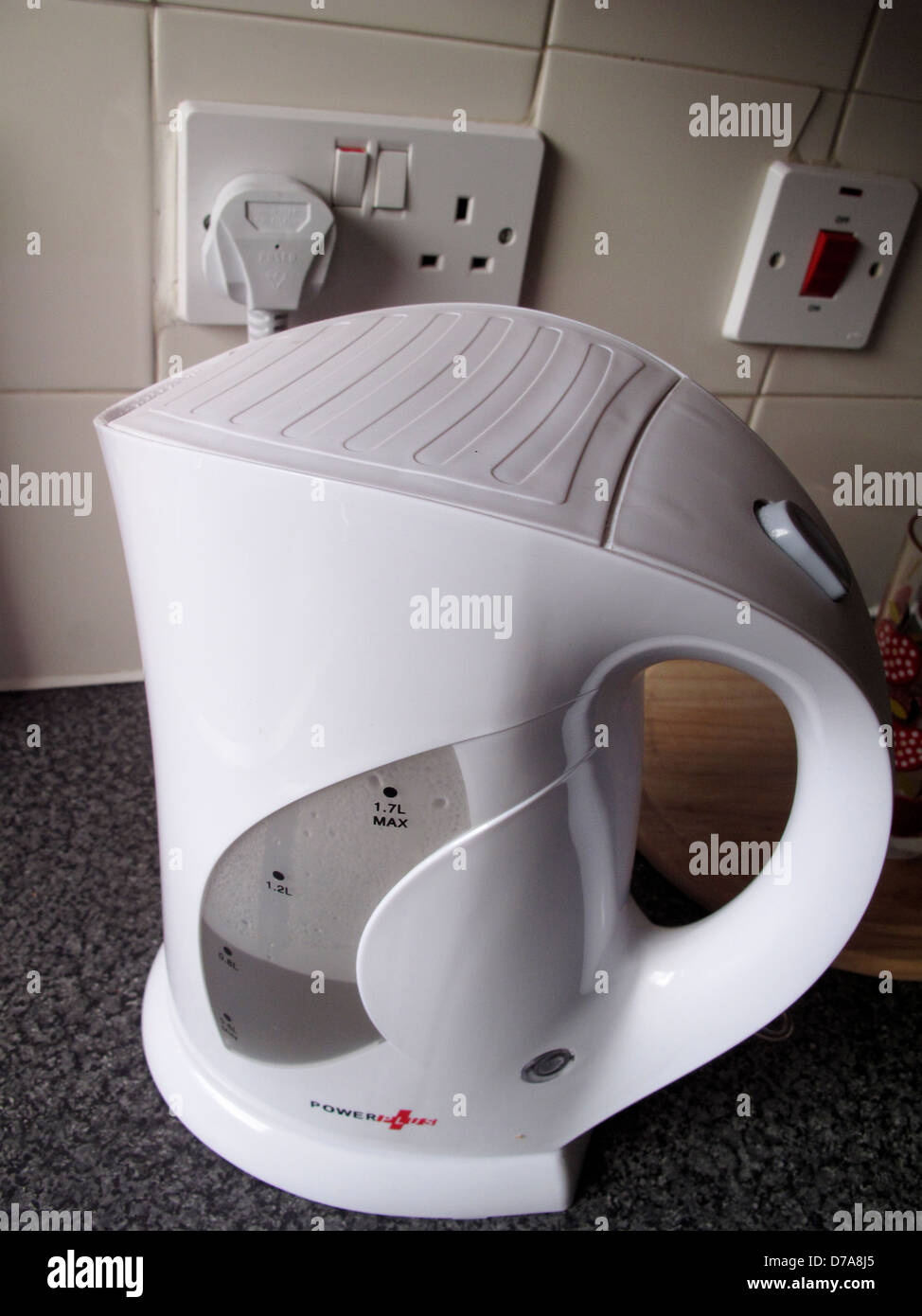 White electric kettle on worktop Stock Photo - Alamy