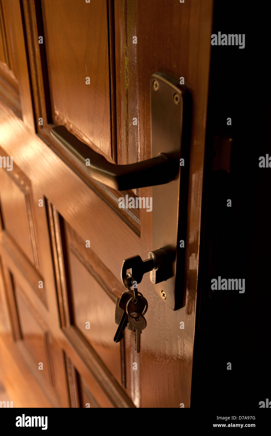 Key in lock Stock Photo - Alamy