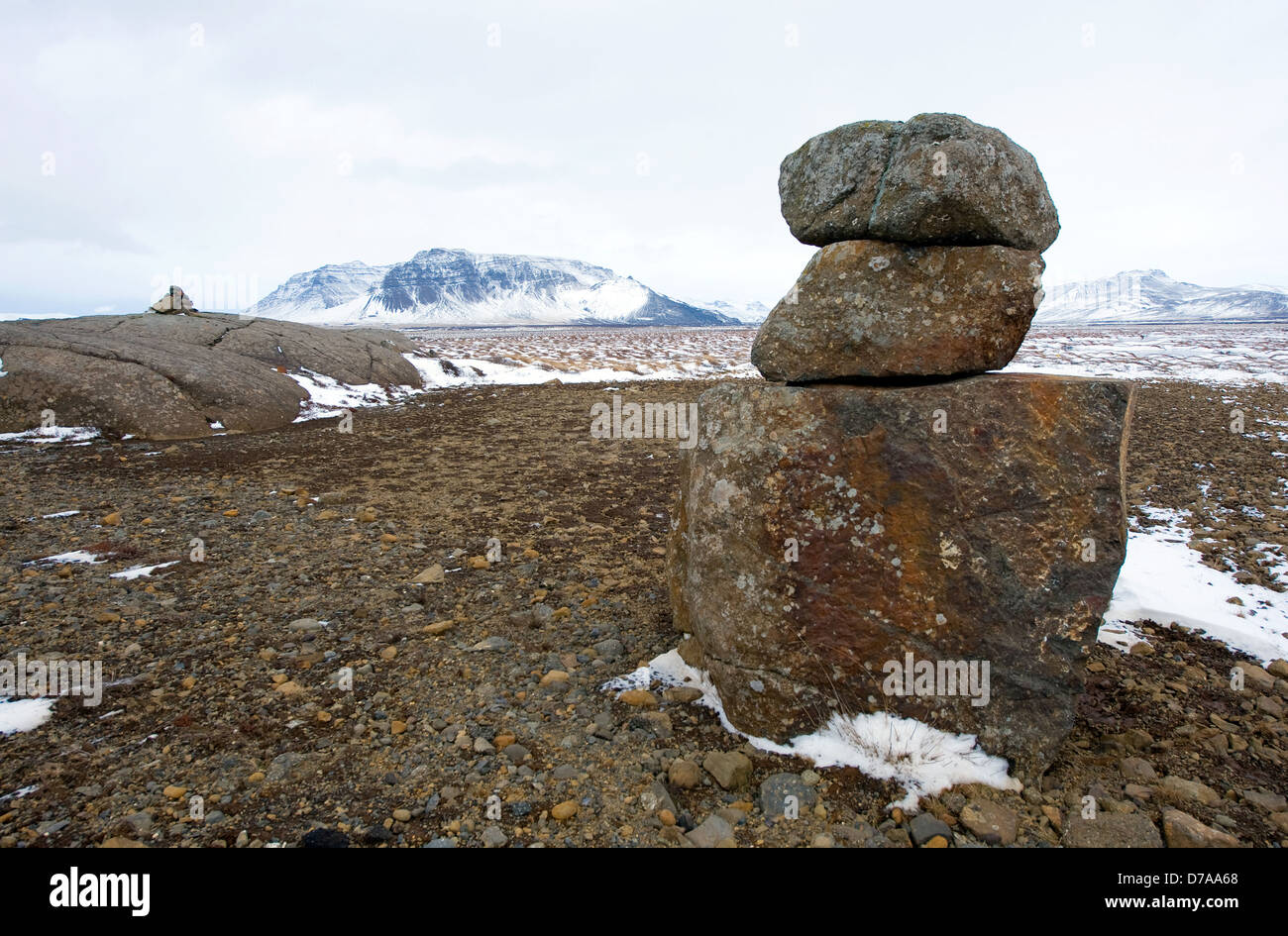 Three rocks built upon each other in the countryside in Iceland in the ...