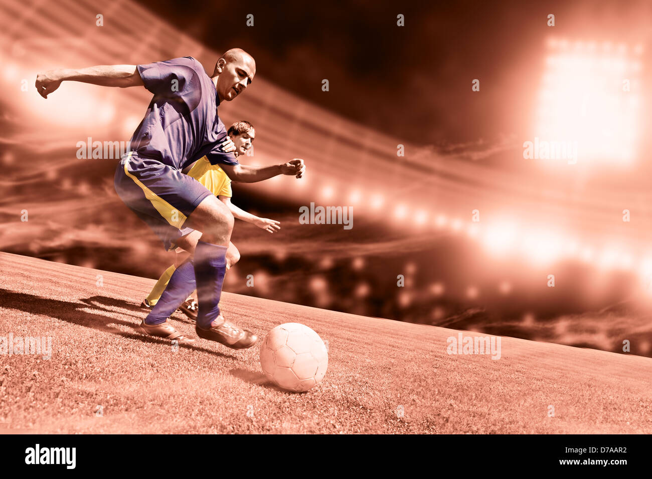 two football players from opposing team on the field Stock Photo - Alamy