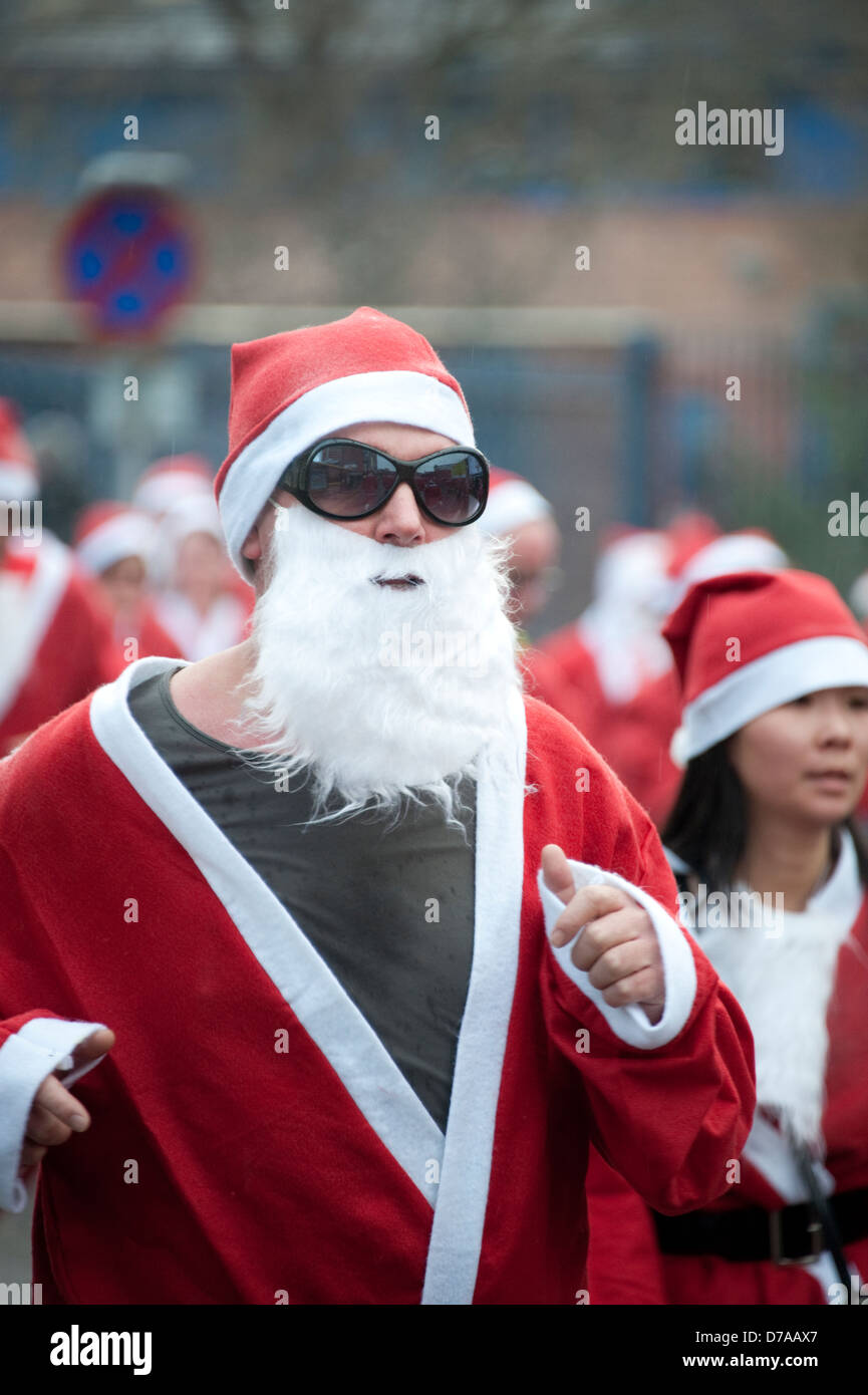 Father Christmas Outfit with Dark Sunglasses Stock Photo - Alamy