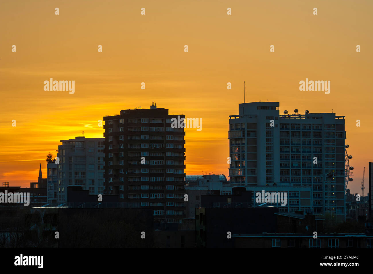 Early evening to sunset. Views of the London landscape including flats ...