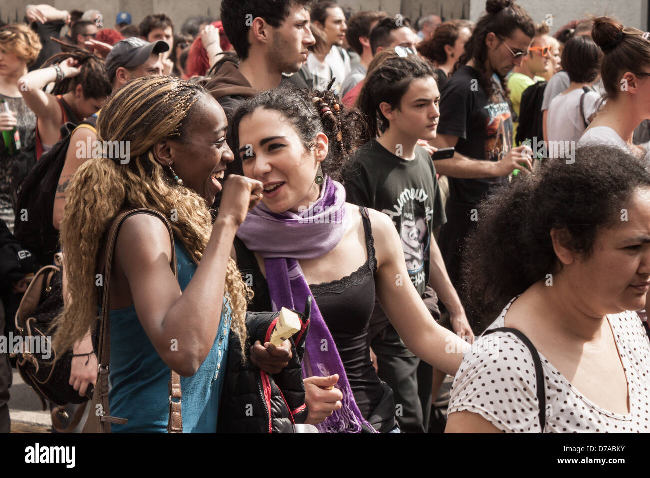 Milan, Italy - May 1, 2013: People march in the streets for the ...
