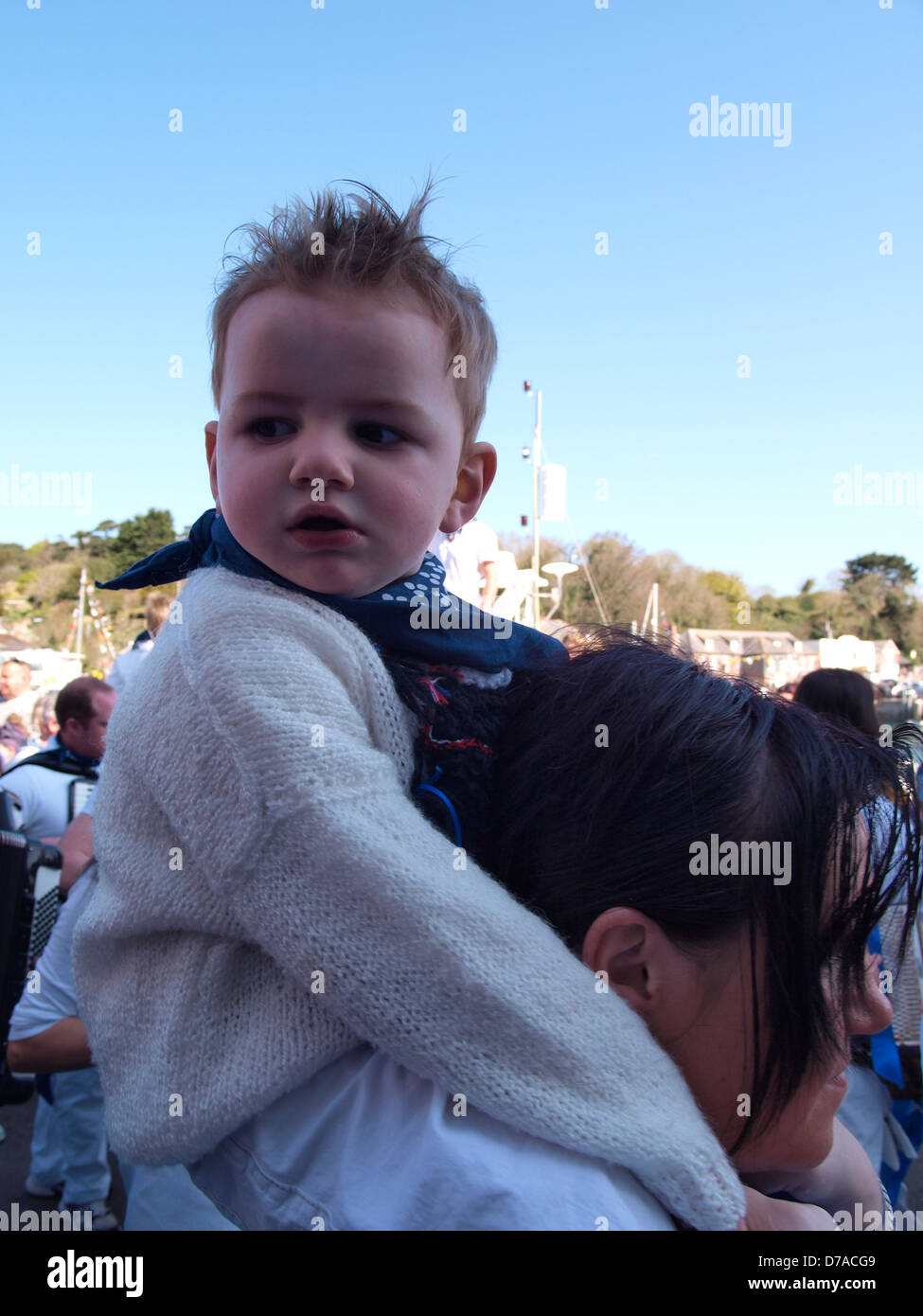 Child carried on shoulders hi-res stock photography and images - Alamy