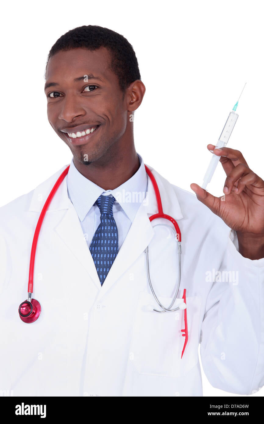 Man with syringe in hand Stock Photo - Alamy