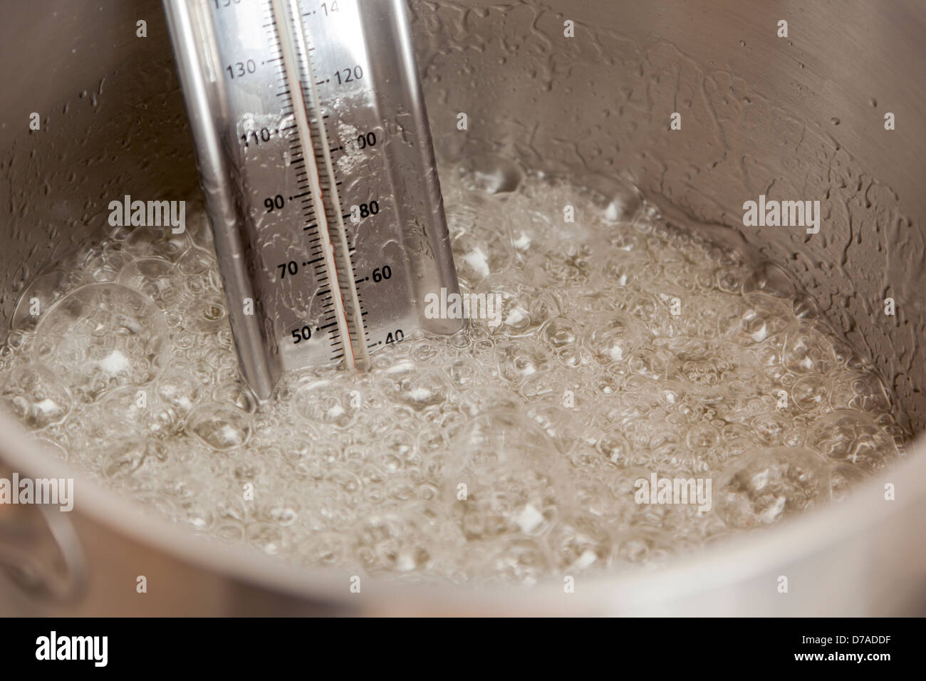 Boiling glucose sugar for candy production Stock Photo - Alamy