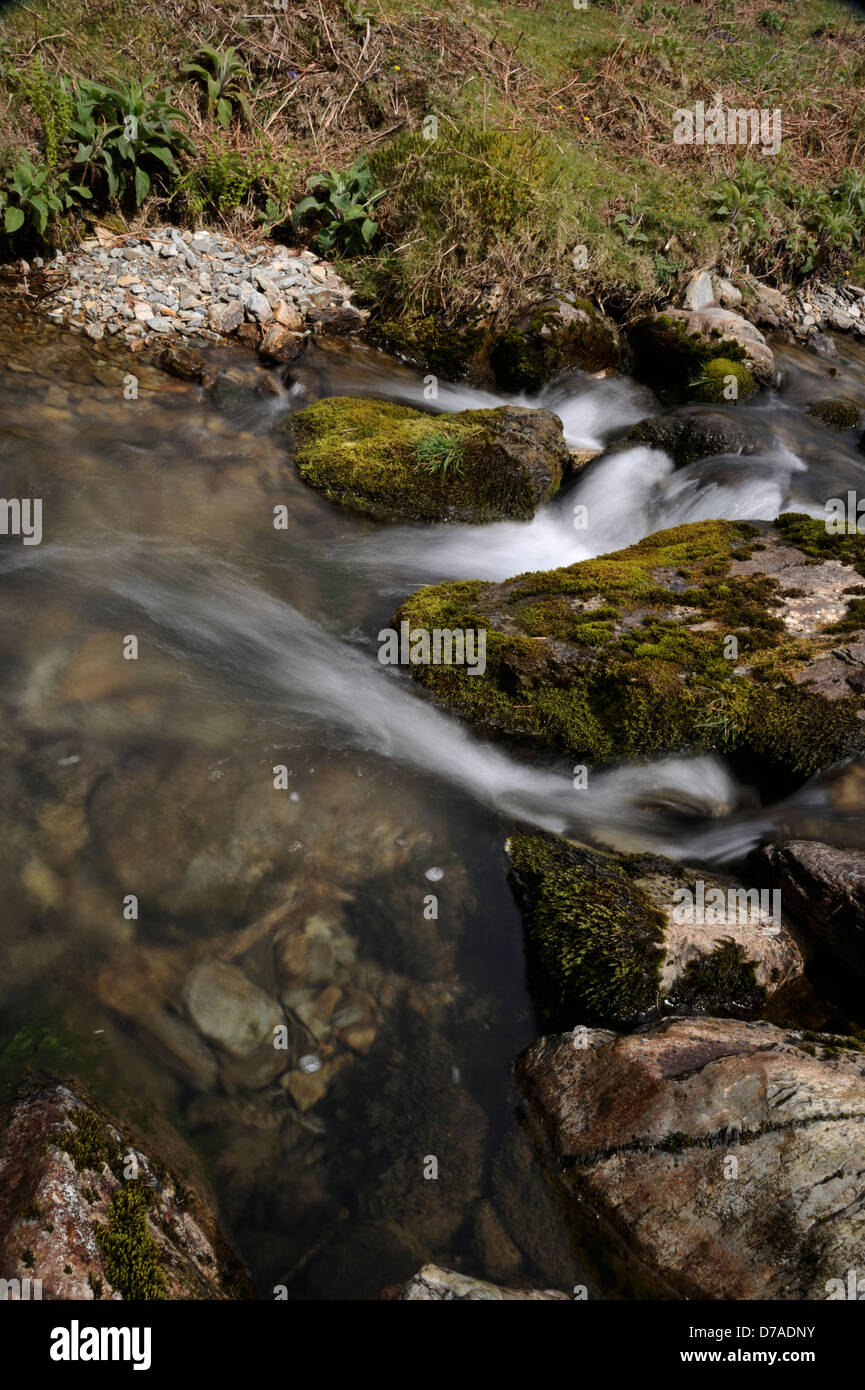 Textures of water and stones above and below surface of "Lake District ...