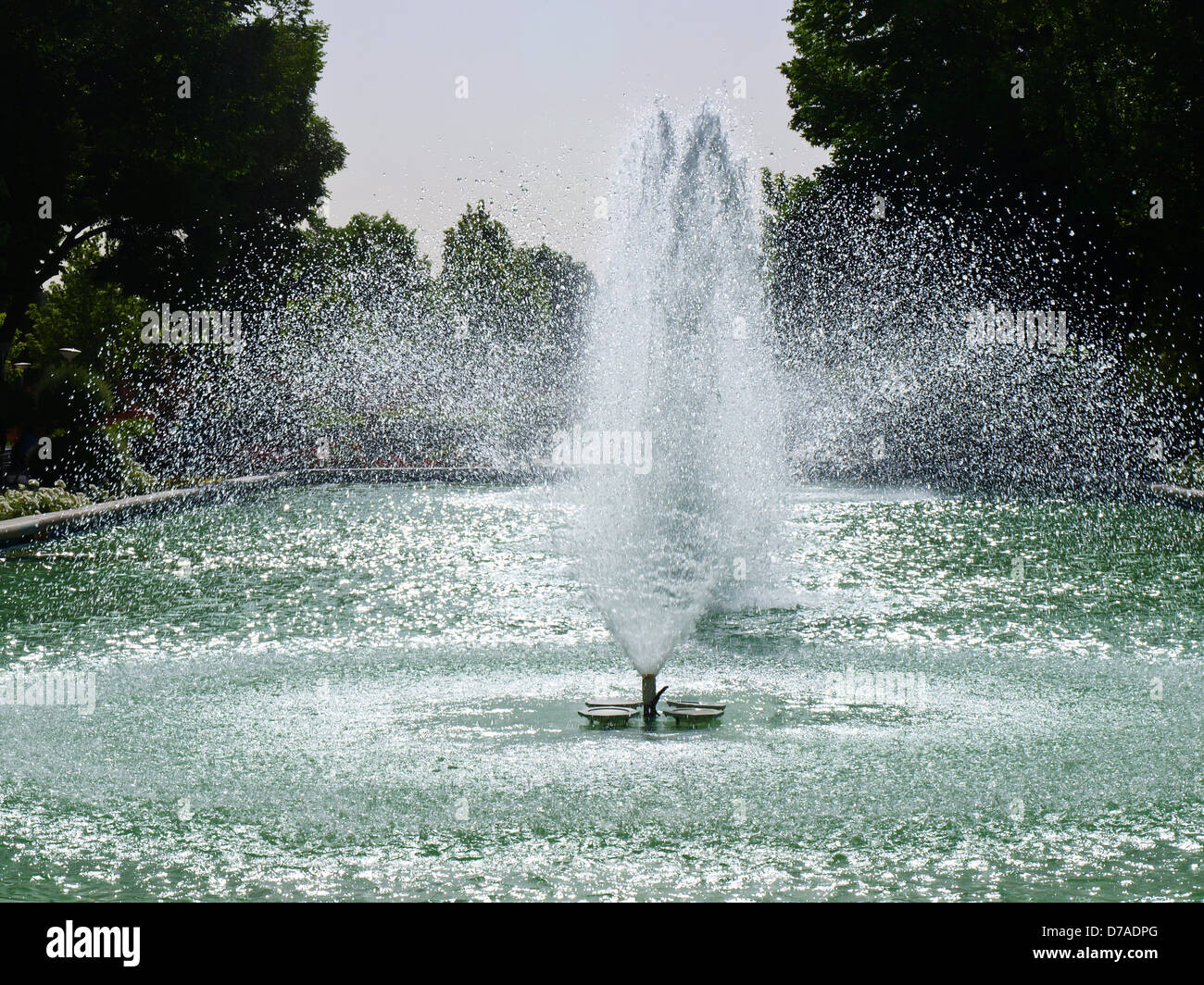 Fountain in a park Stock Photo - Alamy