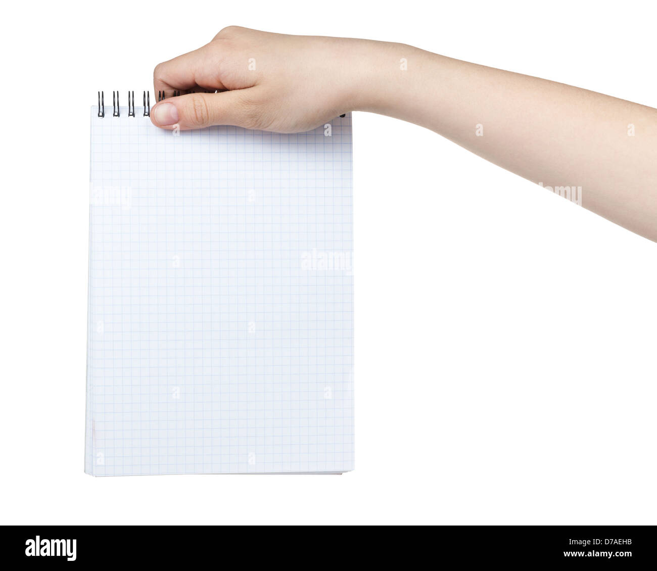 female teen hand holding notebook on a spring with blank page to write ...