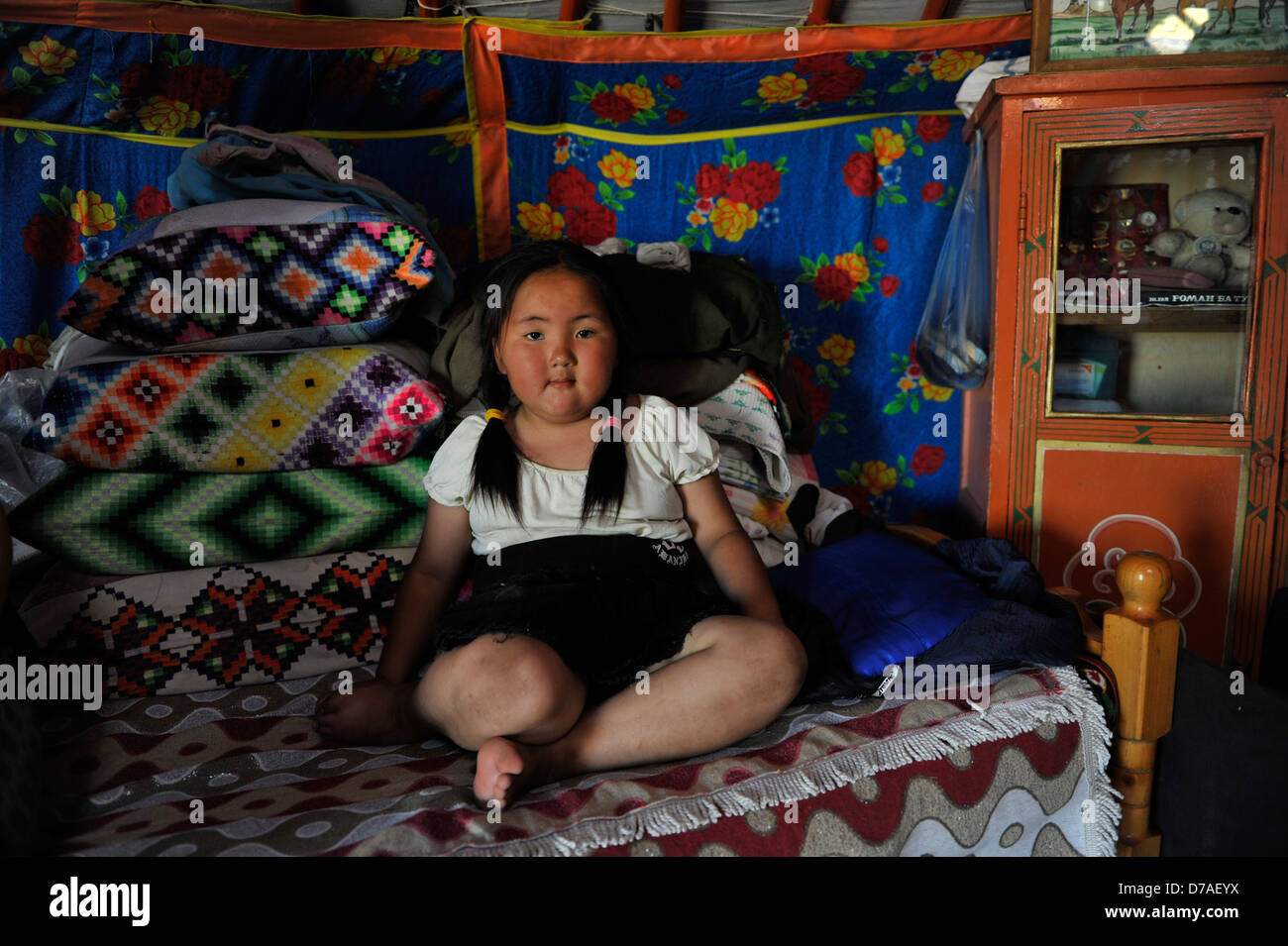 pretty mongolian girl in her yurt Stock Photo - Alamy
