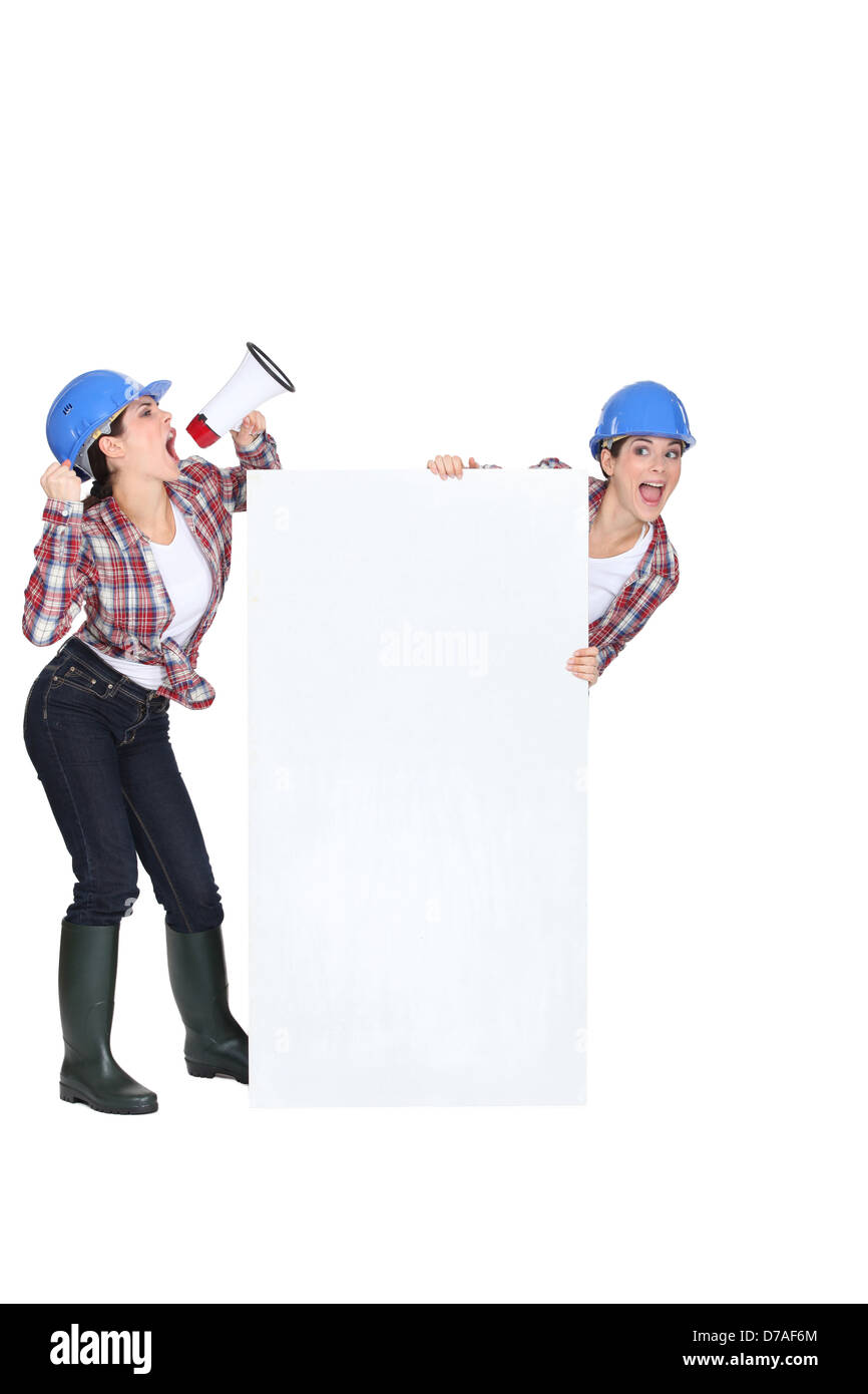 female worker using a megaphone Stock Photo - Alamy