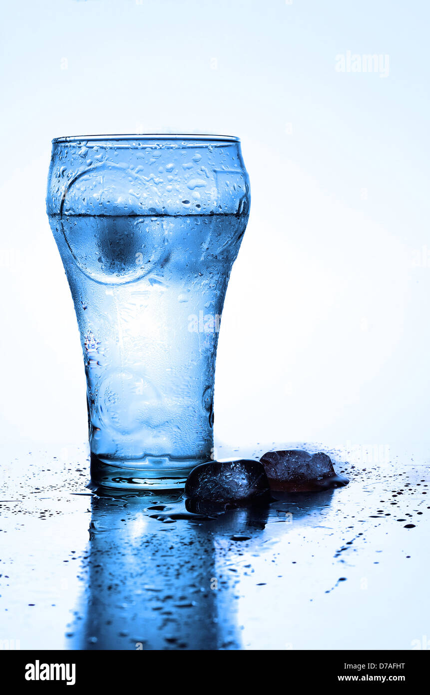 Glass of pure water with ice cubes Stock Photo - Alamy