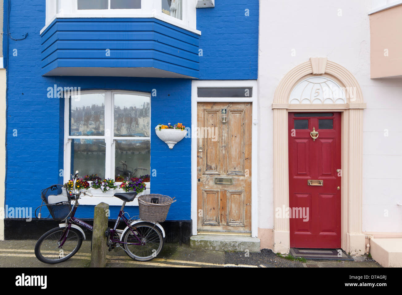 Brightly coloured cottages overlooking Weymouth Harbour, Dorset ...