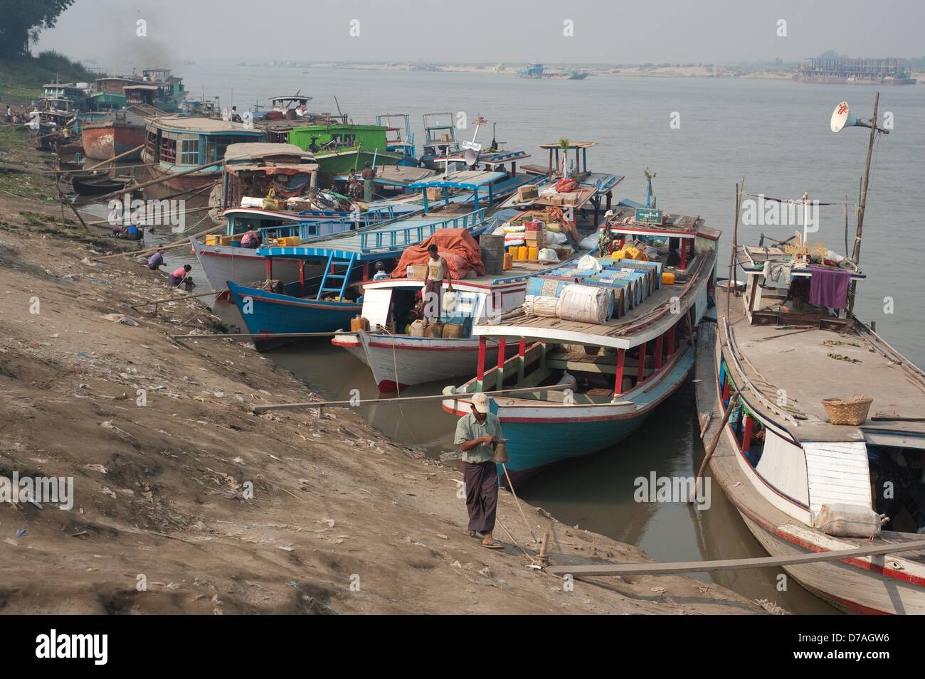 Myanmar Boats are lined up at Mayanchan Jetty on the shores of the ...