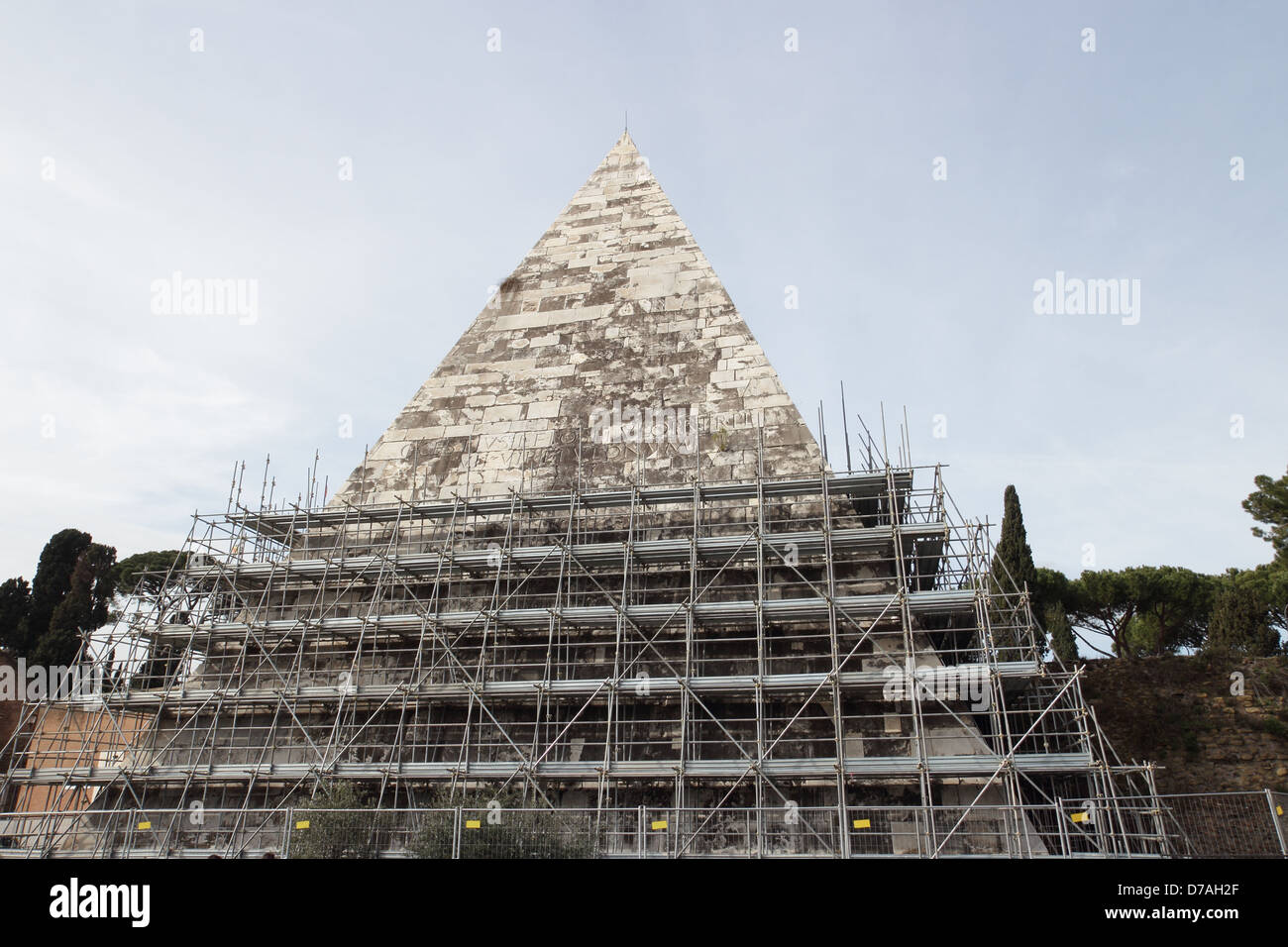 The Pyramid of Cestius during restoring works in Rome, Italy Stock ...