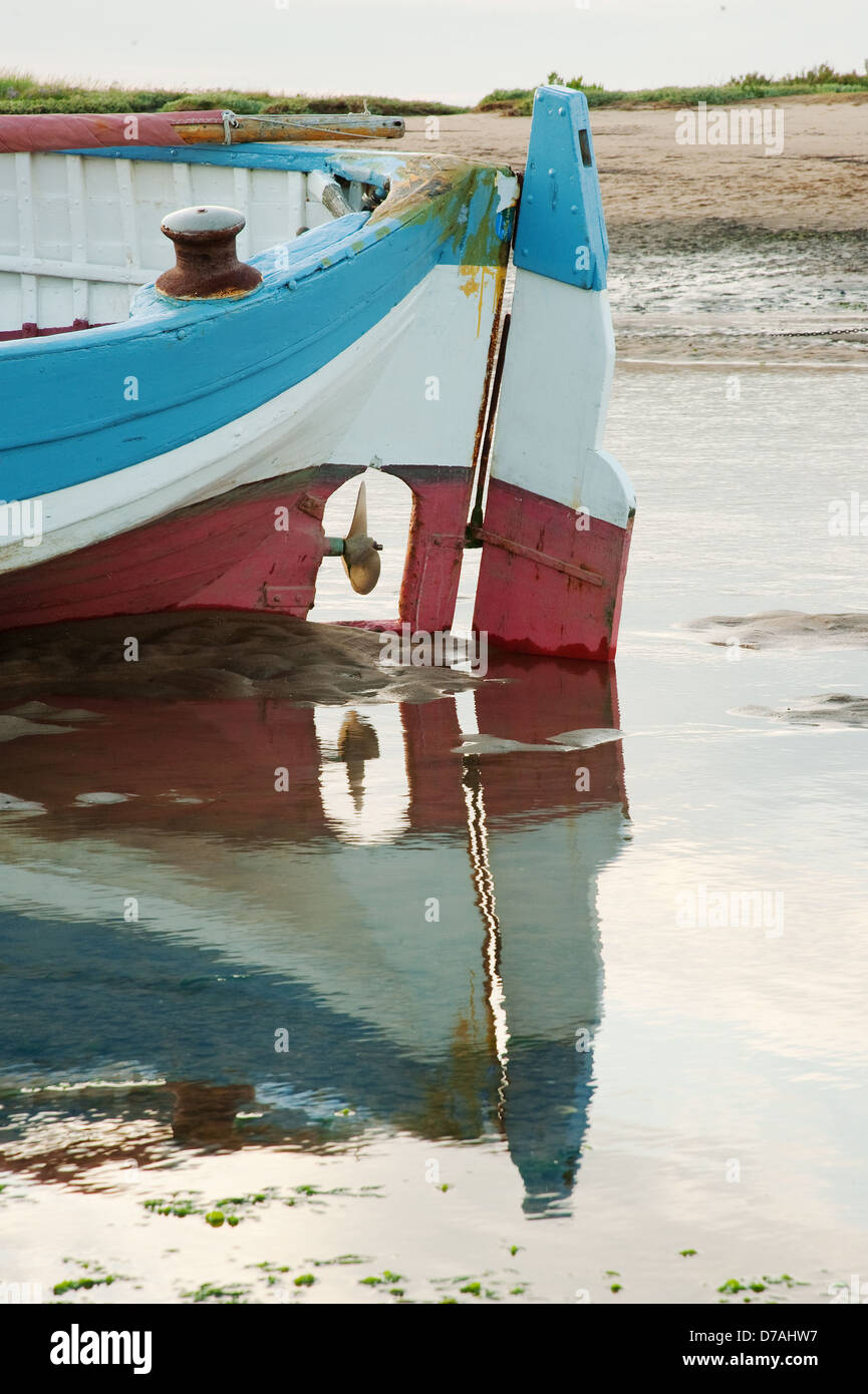 Boat at low tide Stock Photo - Alamy