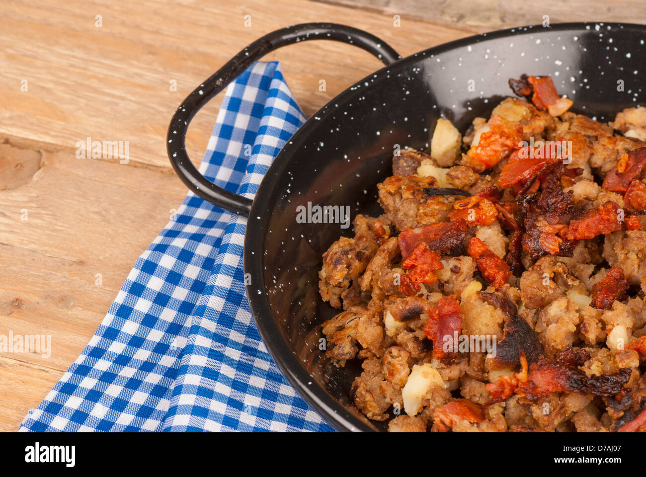 A pan with traditional Spanish migas Stock Photo - Alamy