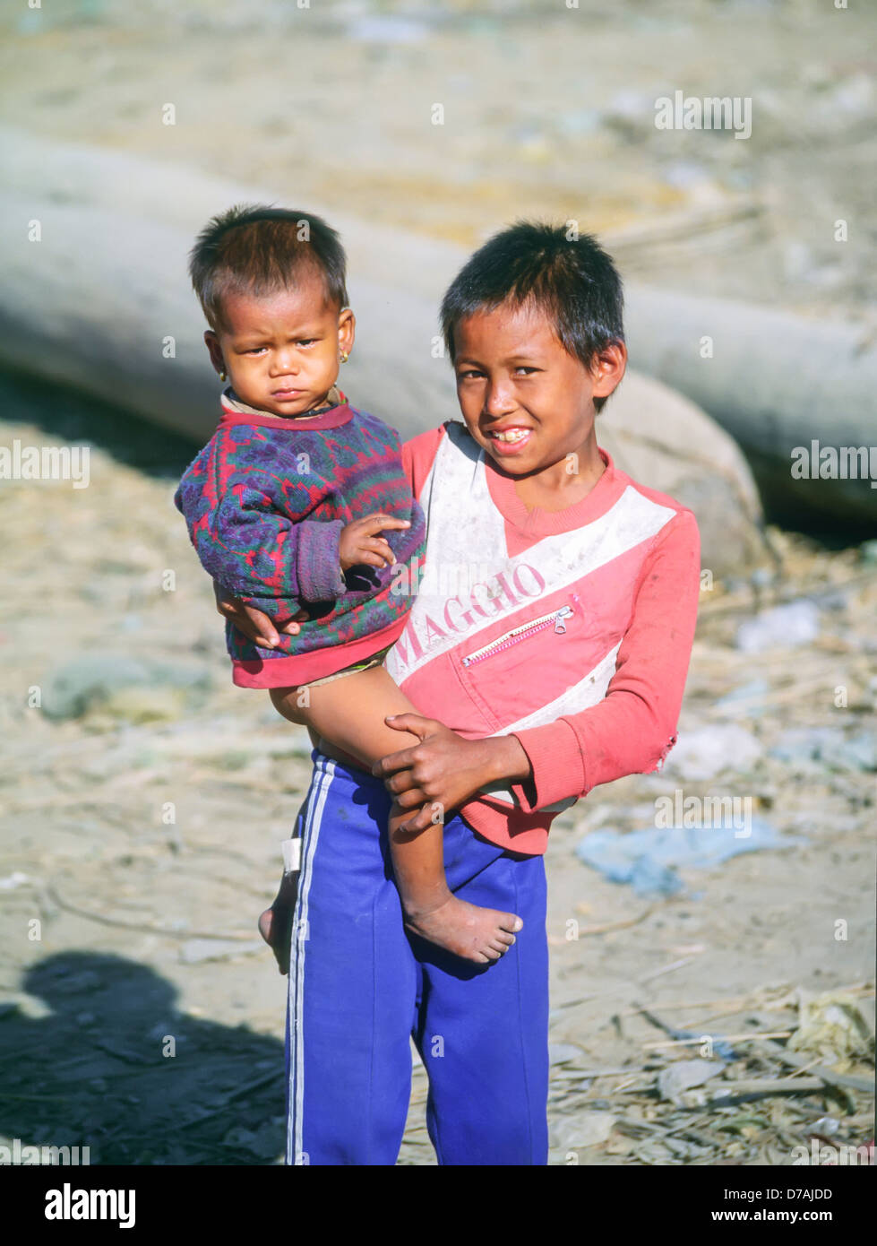 Burmese children at Mandalay, Burma (Myanmar) - elder child carrying ...
