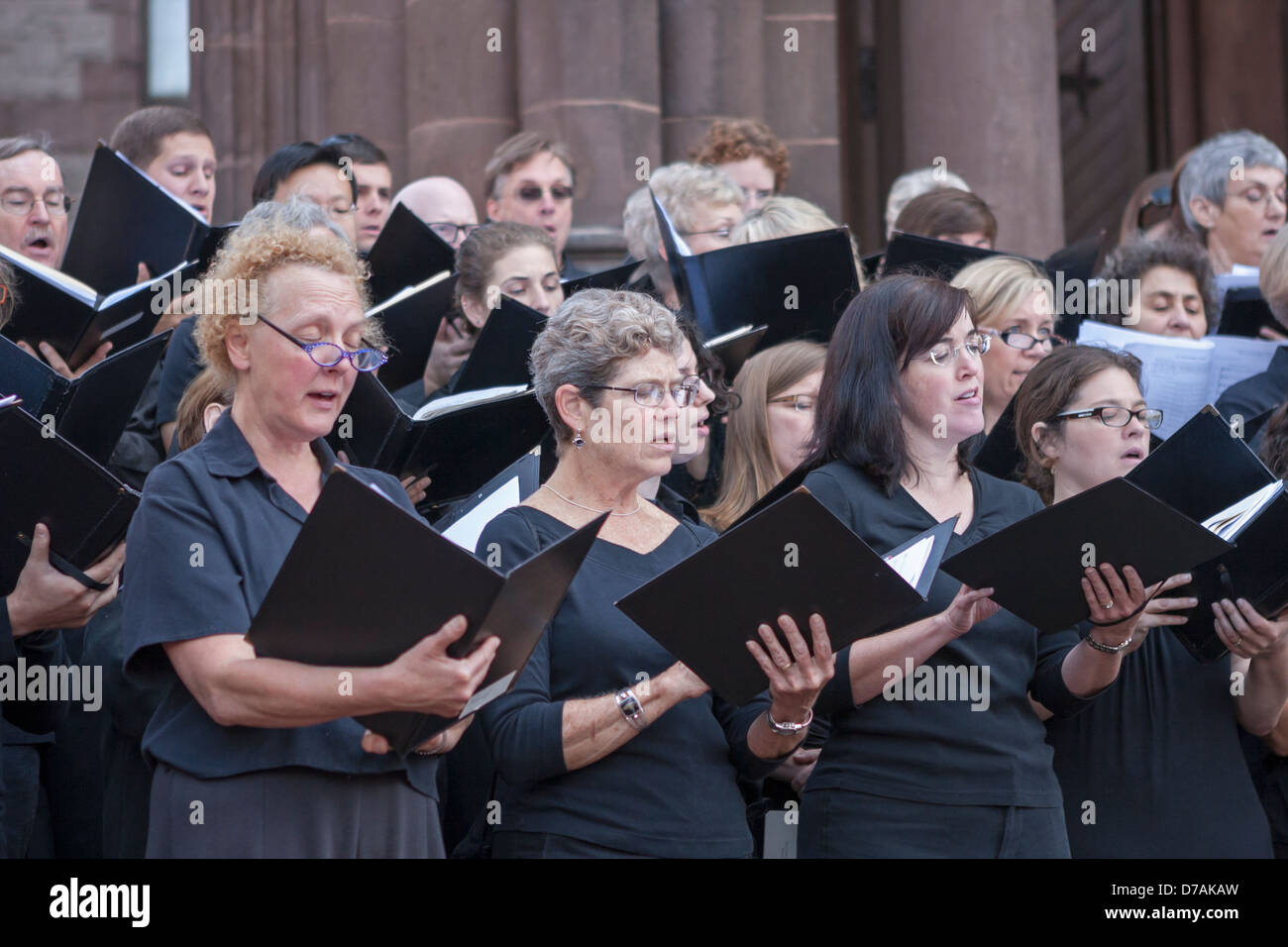 Members of a choir sing at a memorial concert in Boston Stock Photo - Alamy