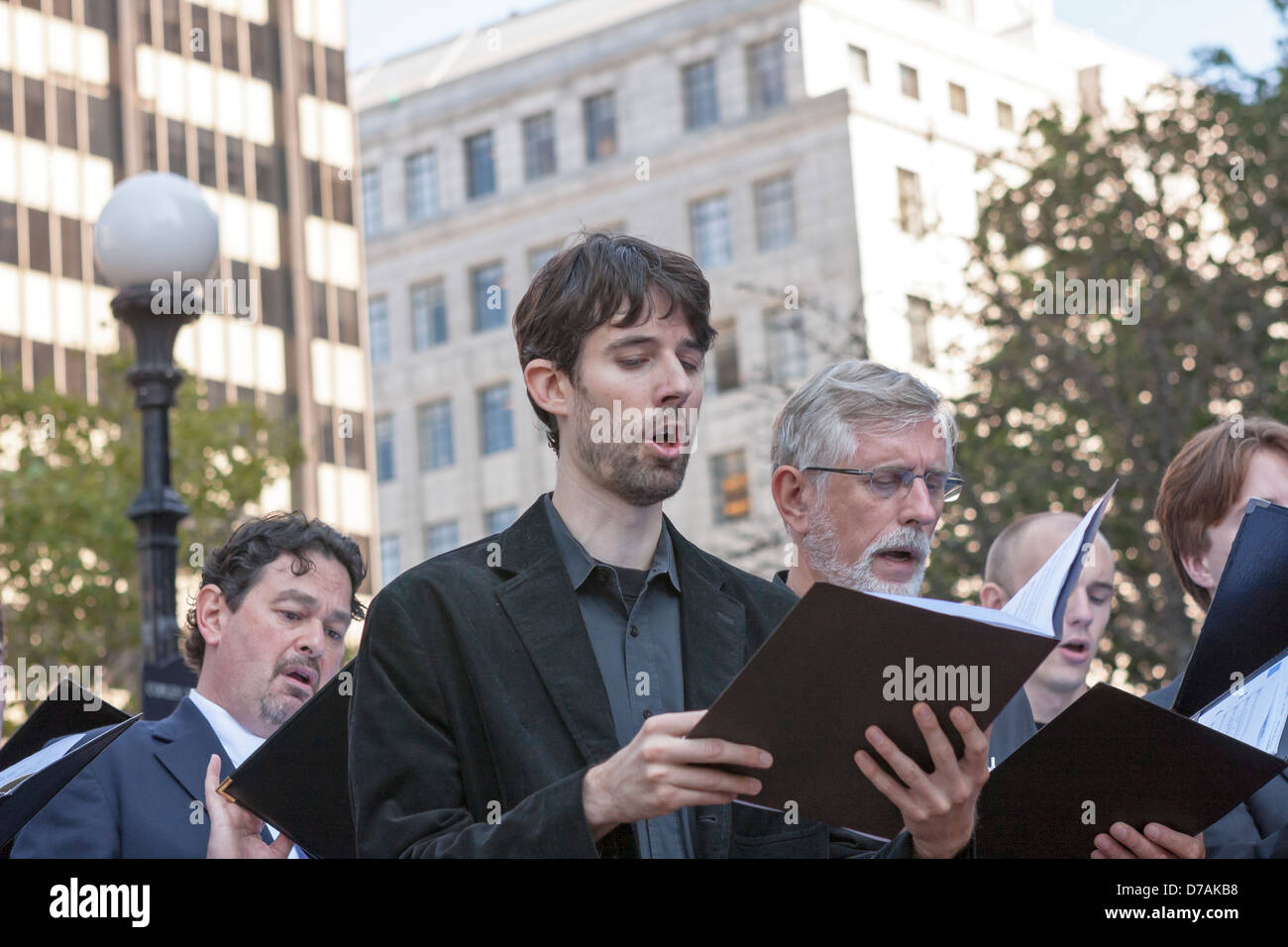 Members of a choir sing at a memorial concert in Boston Stock Photo - Alamy