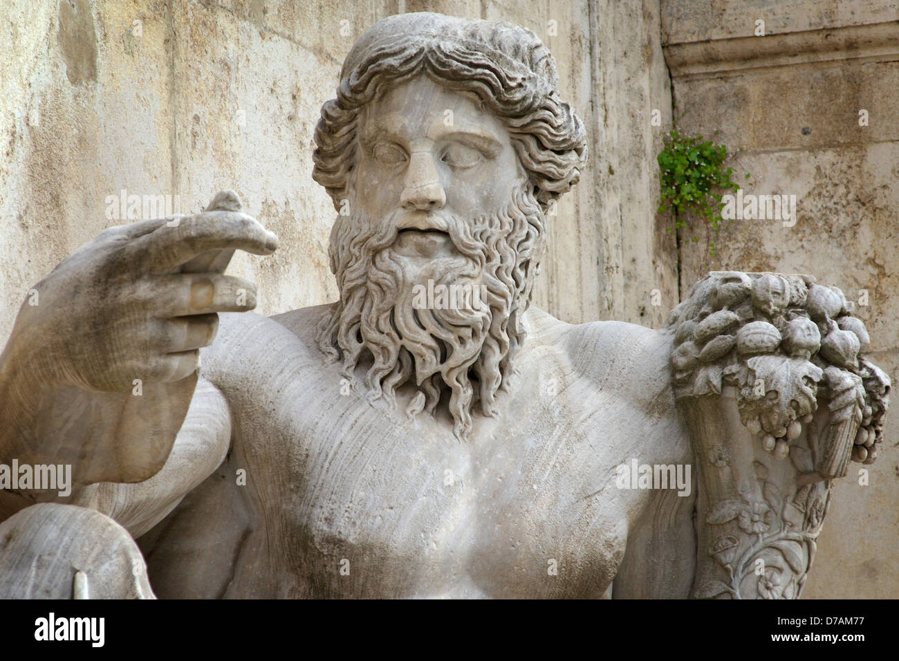 close up statue of old father tiber holding a horn of plenty rome italy ...