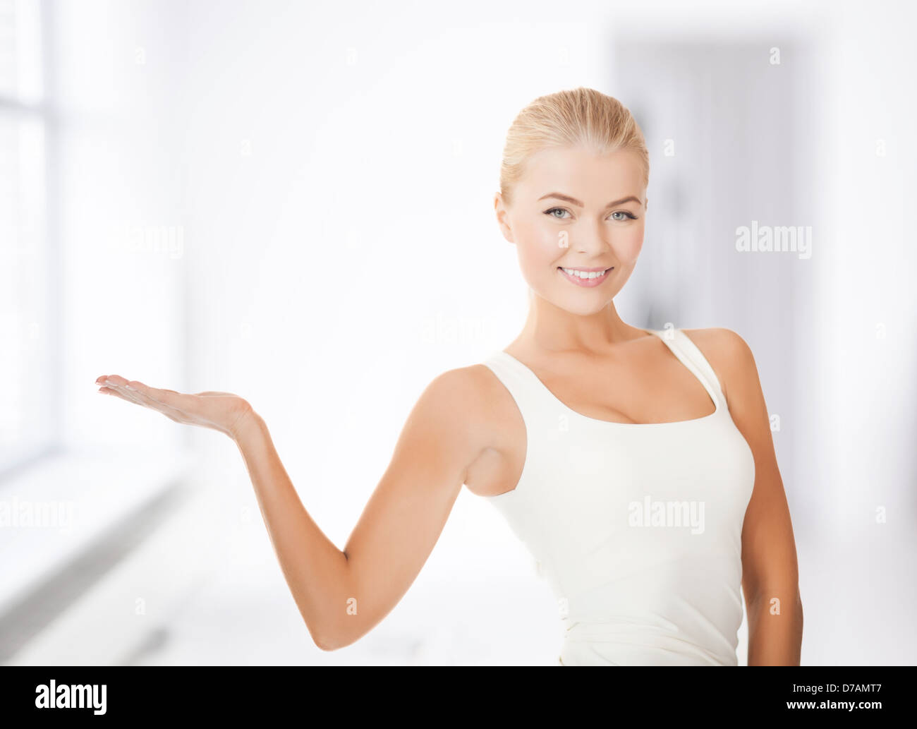 woman in sportswear with empty hand Stock Photo - Alamy