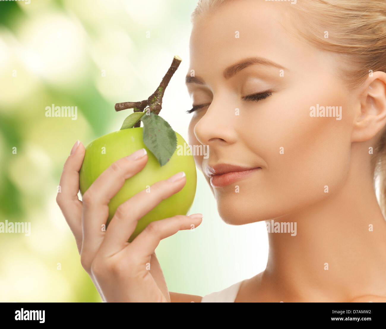 woman smelling apple Stock Photo - Alamy
