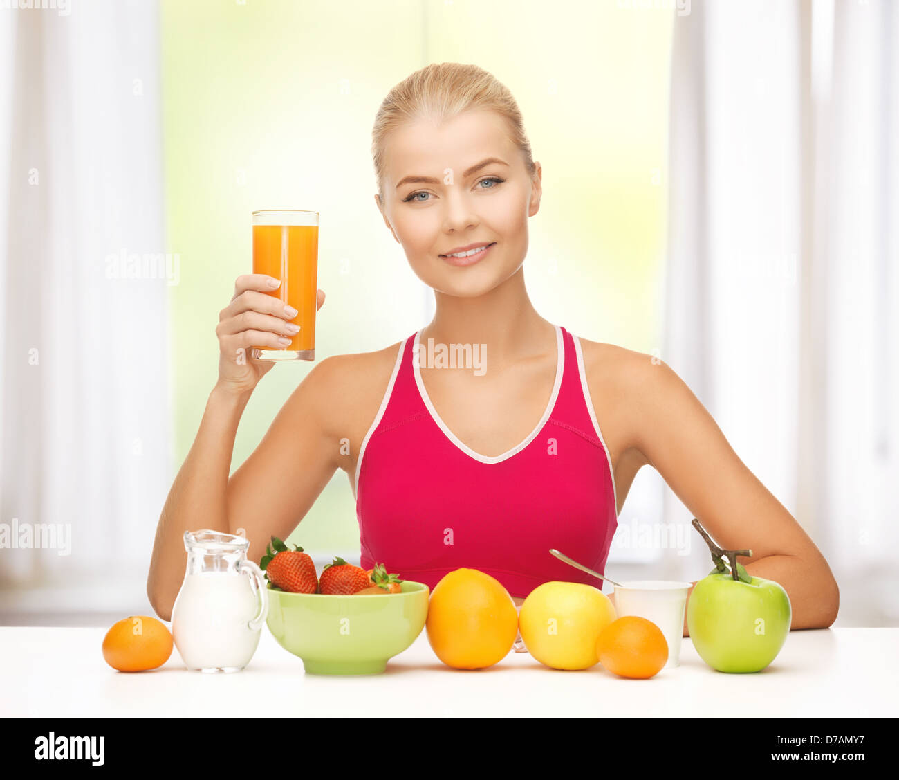 young woman eating healthy breakfast Stock Photo - Alamy