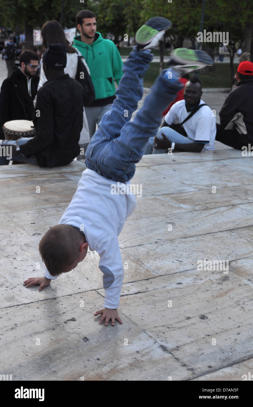 A young boy in balance on his hands Stock Photo - Alamy