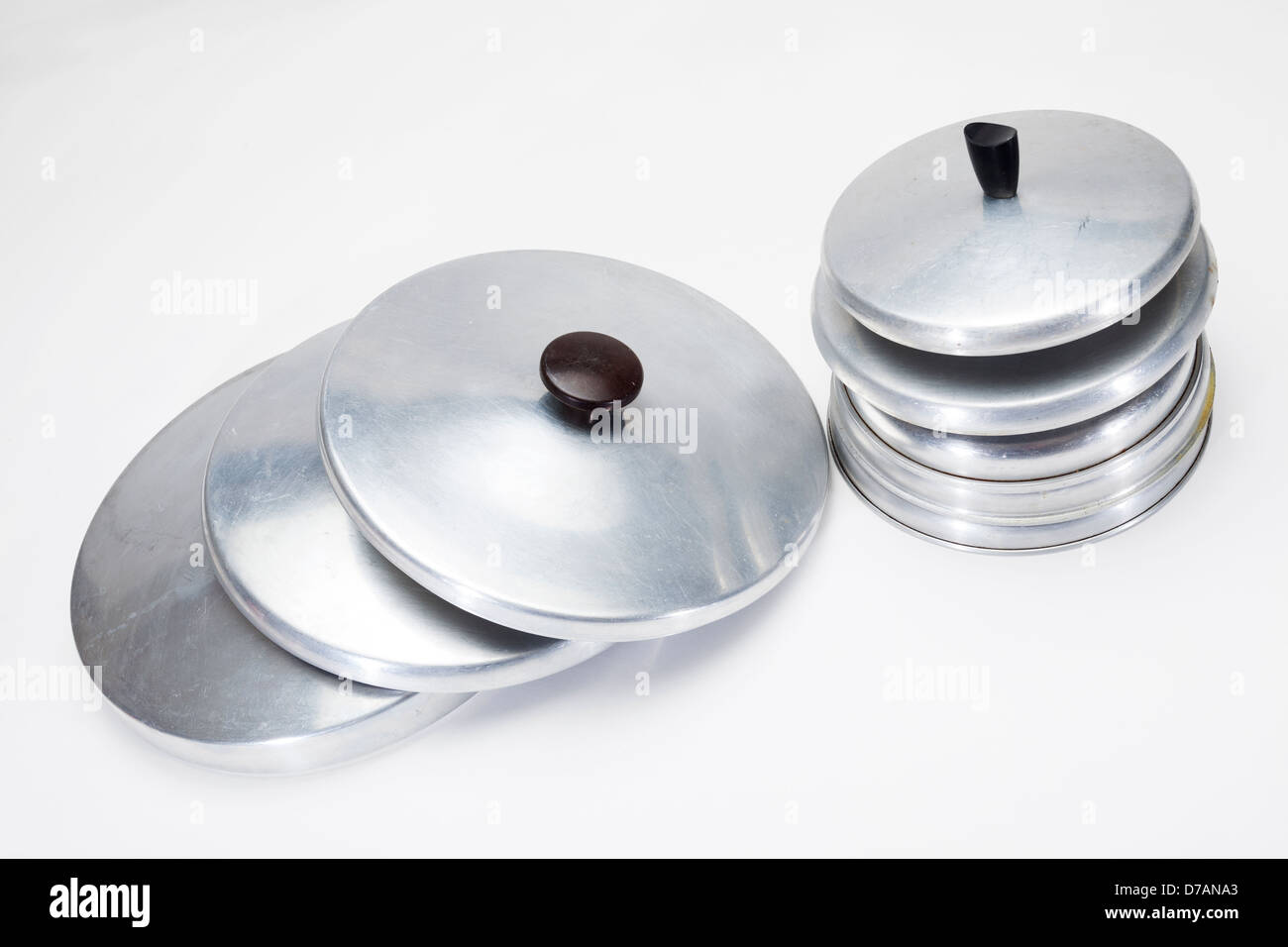 A collection of pot lids for cookware and frying pans Stock Photo - Alamy