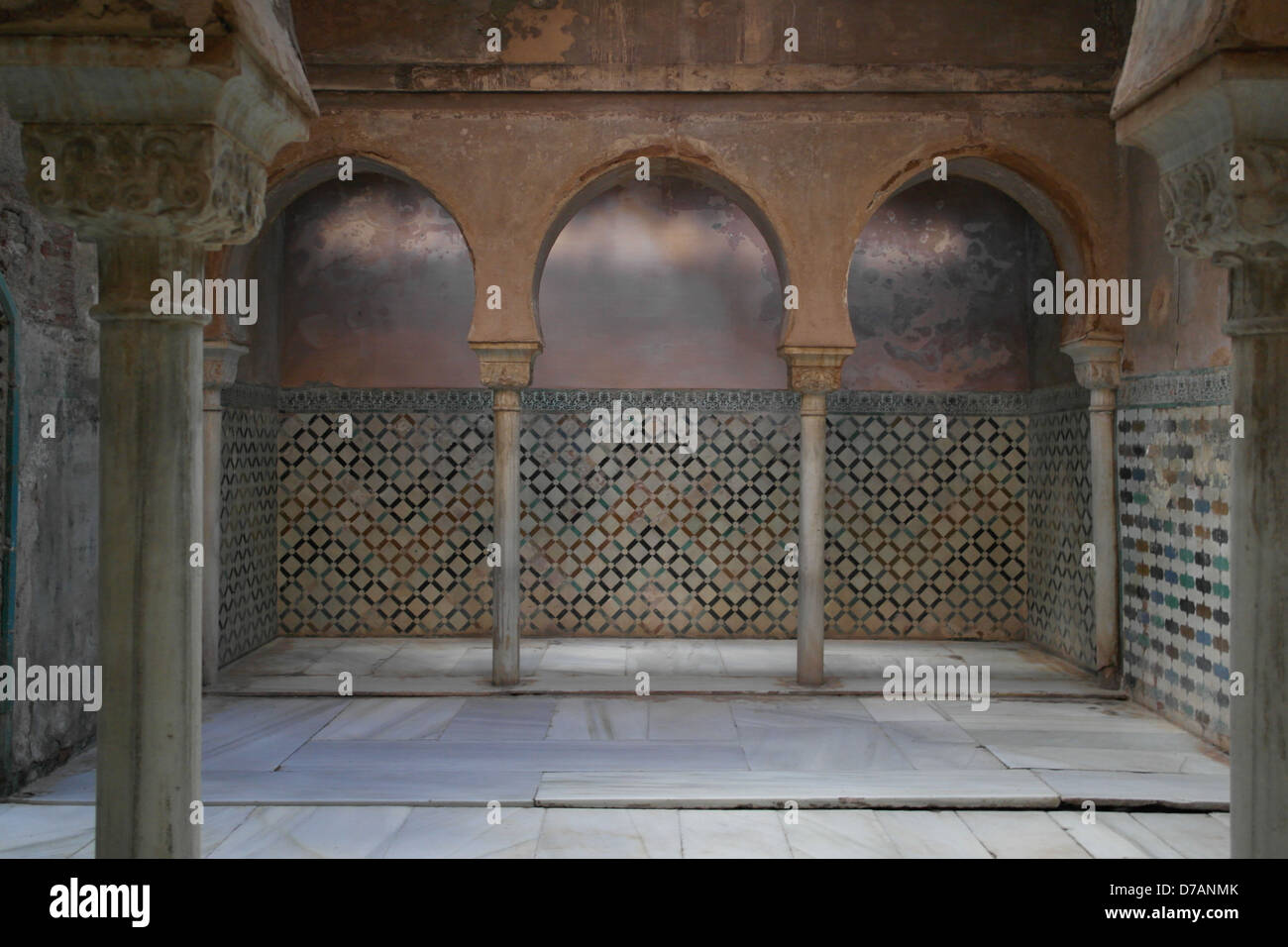 Alhambra. Beautiful al-Andalus arches, copper tinted walls, patterned ...