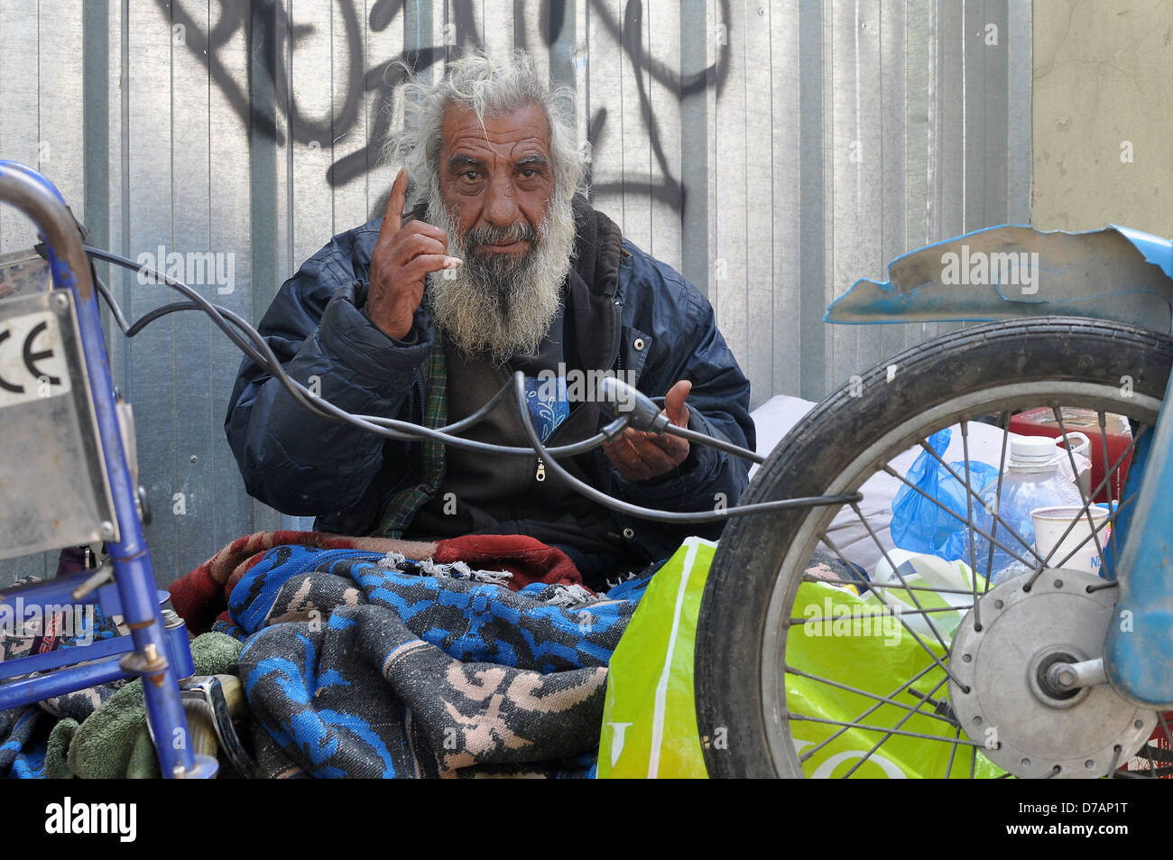 Homeless iraqi war refugee in Athens, greece Stock Photo - Alamy