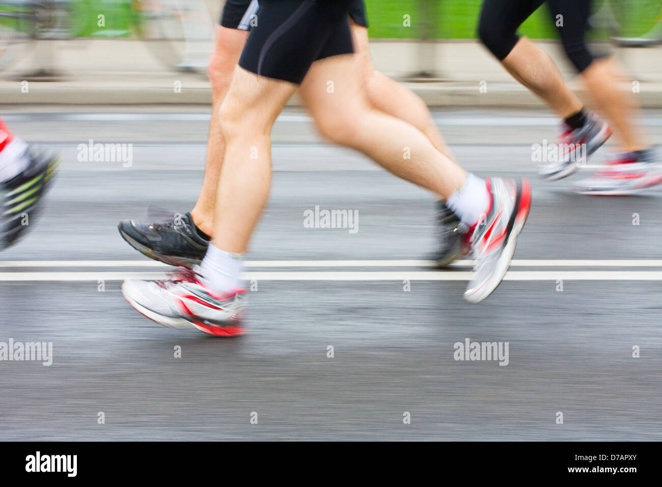 People running in city marathon Stock Photo - Alamy