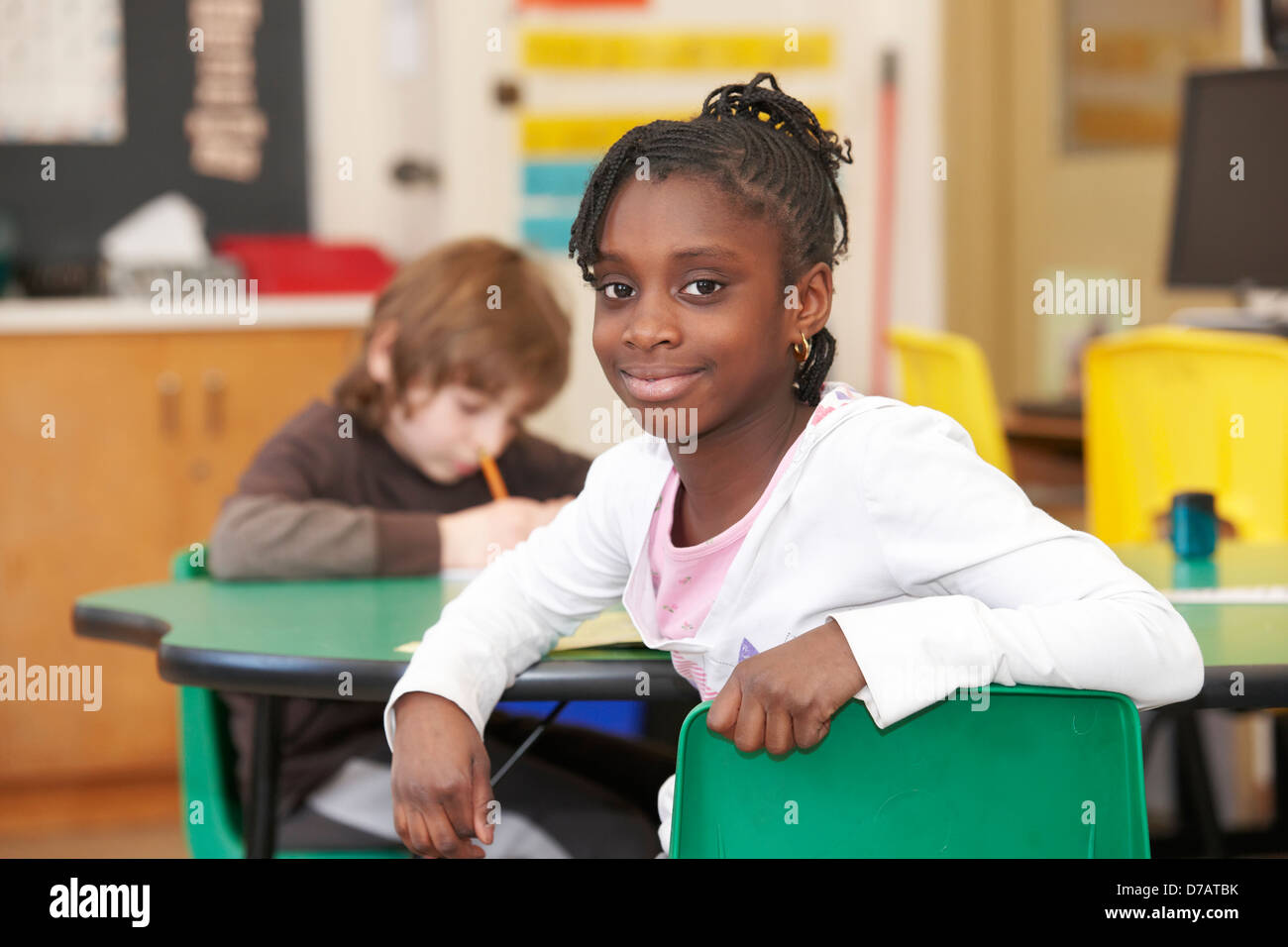 Young Grade 3 Girl Happy And Smiling In The Classroom; Toronto Ontario ...