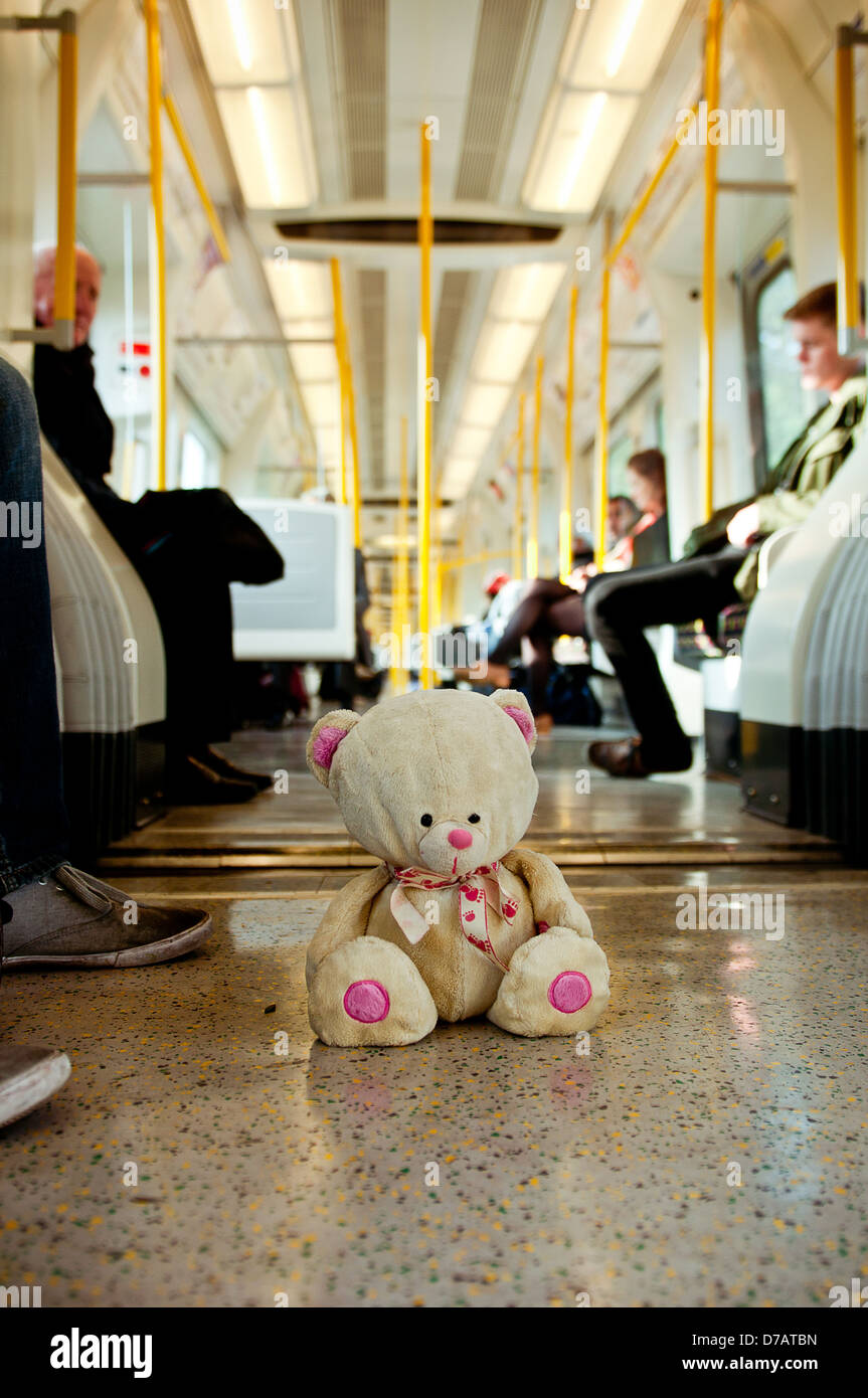 A teddy bear on the floor of a Metropolitan line tube train Stock Photo ...
