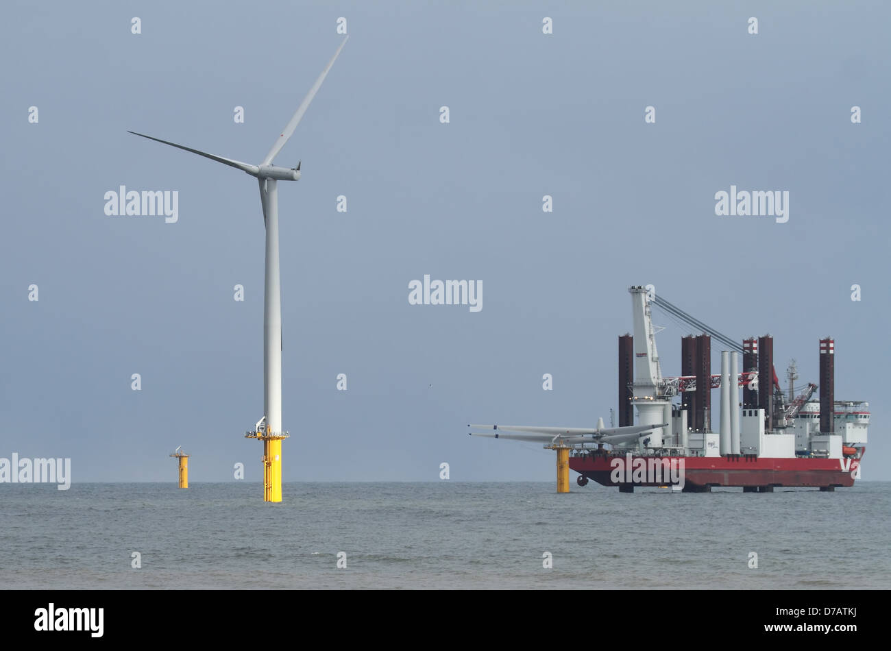 wind farm construction rig installing new wind turbines offshore at ...