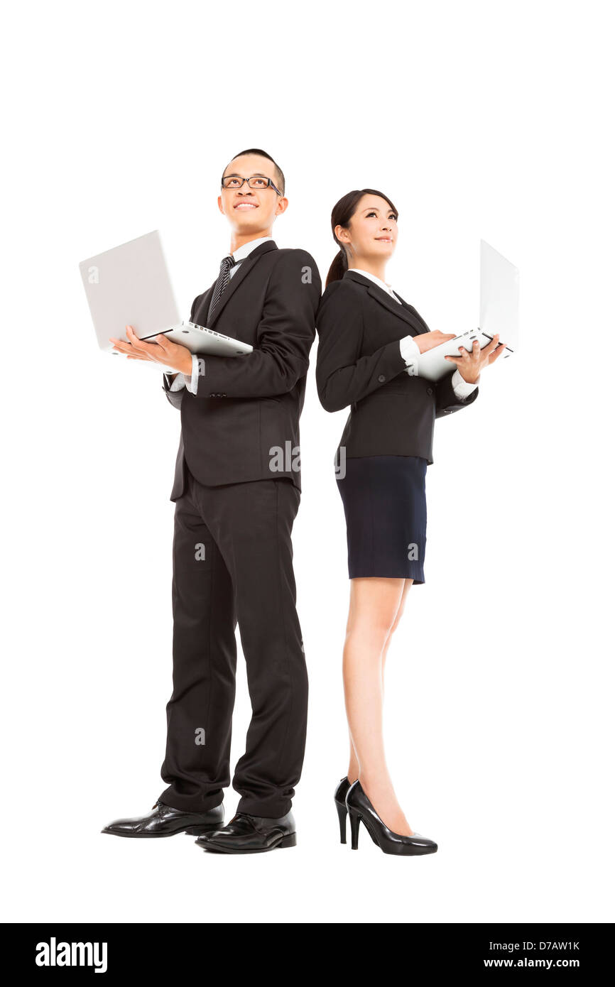Man woman standing laptop Cut Out Stock Images & Pictures - Alamy