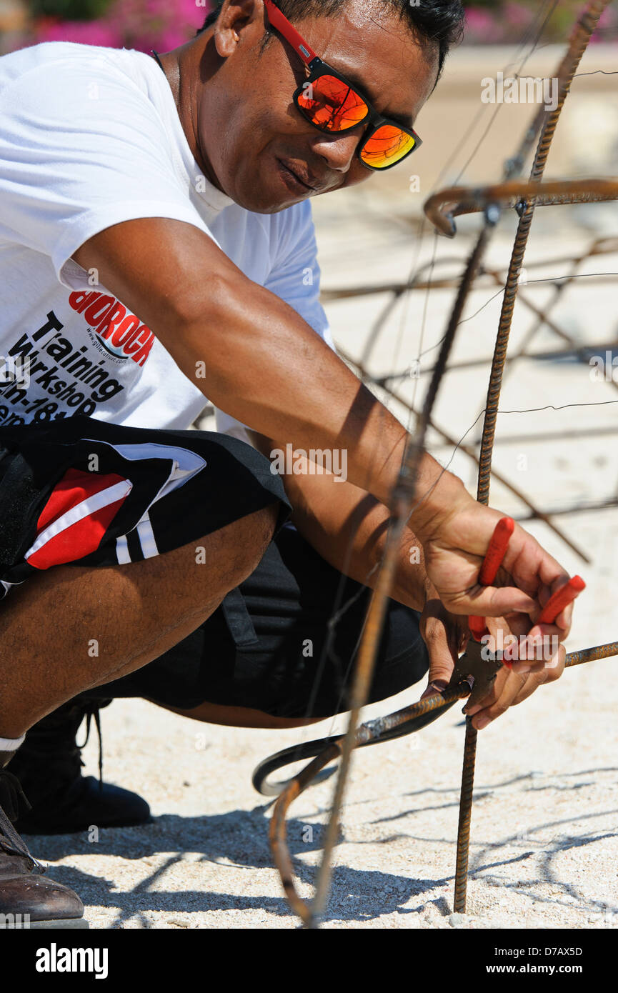 Participant at the 8th Annual Biorock Workshop learning how to build a ...