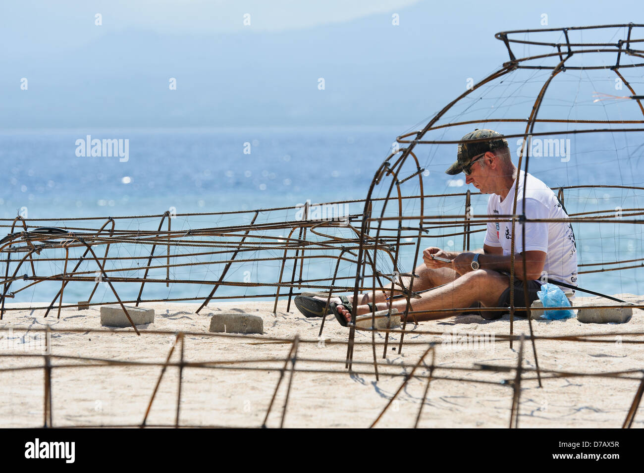 Participant at the 8th Annual Biorock Workshop building a Biorock ...