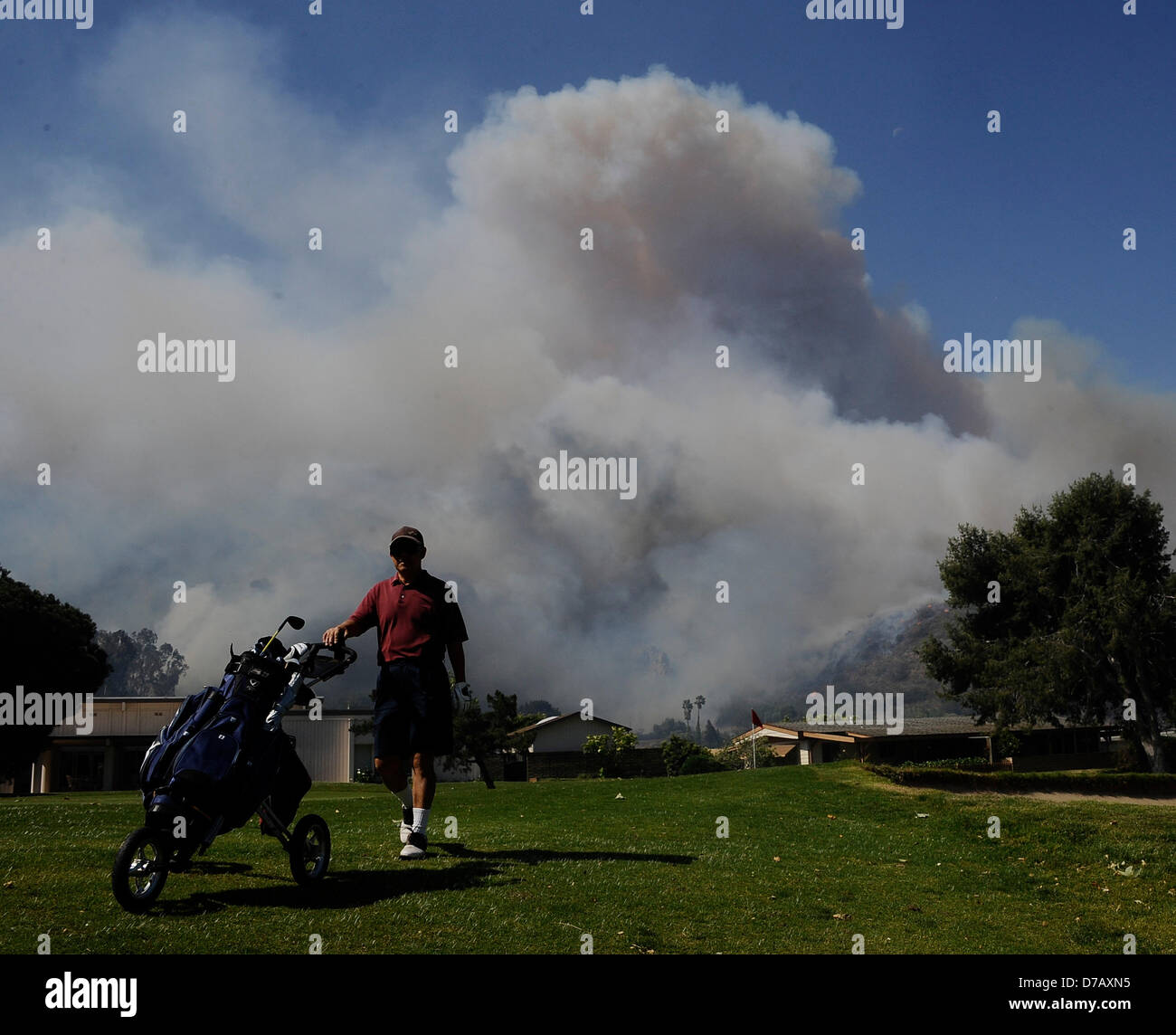 Camarillo, CA, USA. May 2, 2013. Golfers continue to play through as a ...
