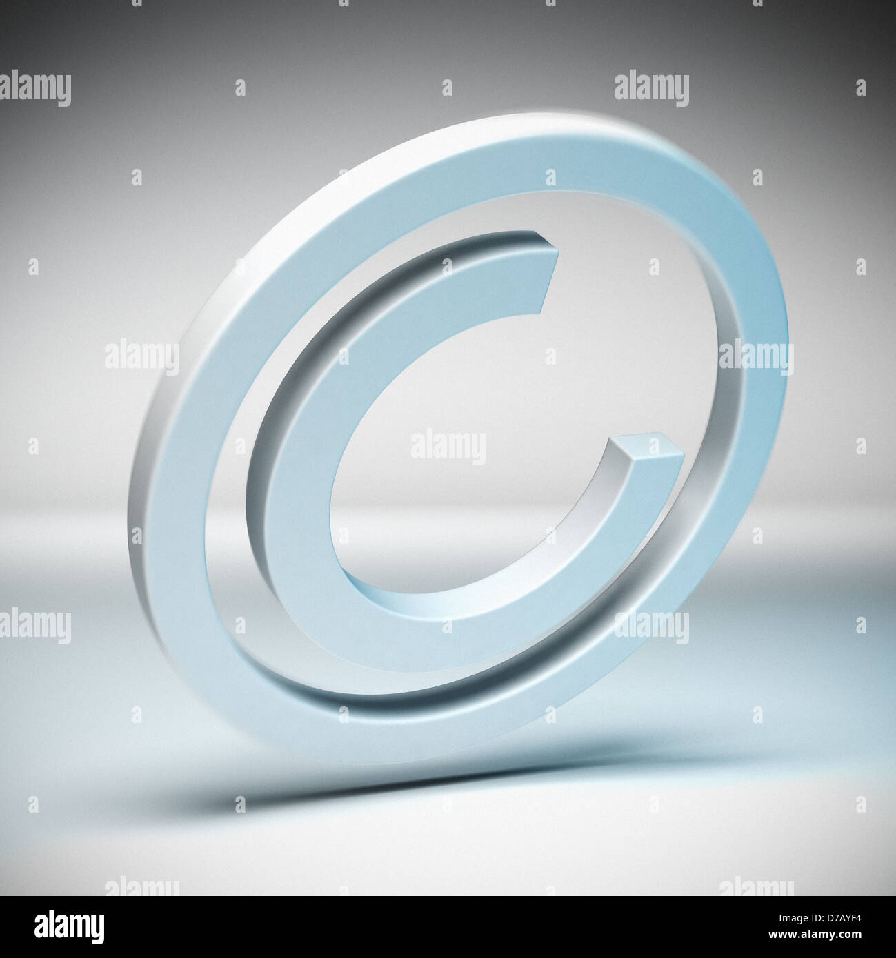 Copyright symbol with blur effect over a grey bakground Stock Photo - Alamy