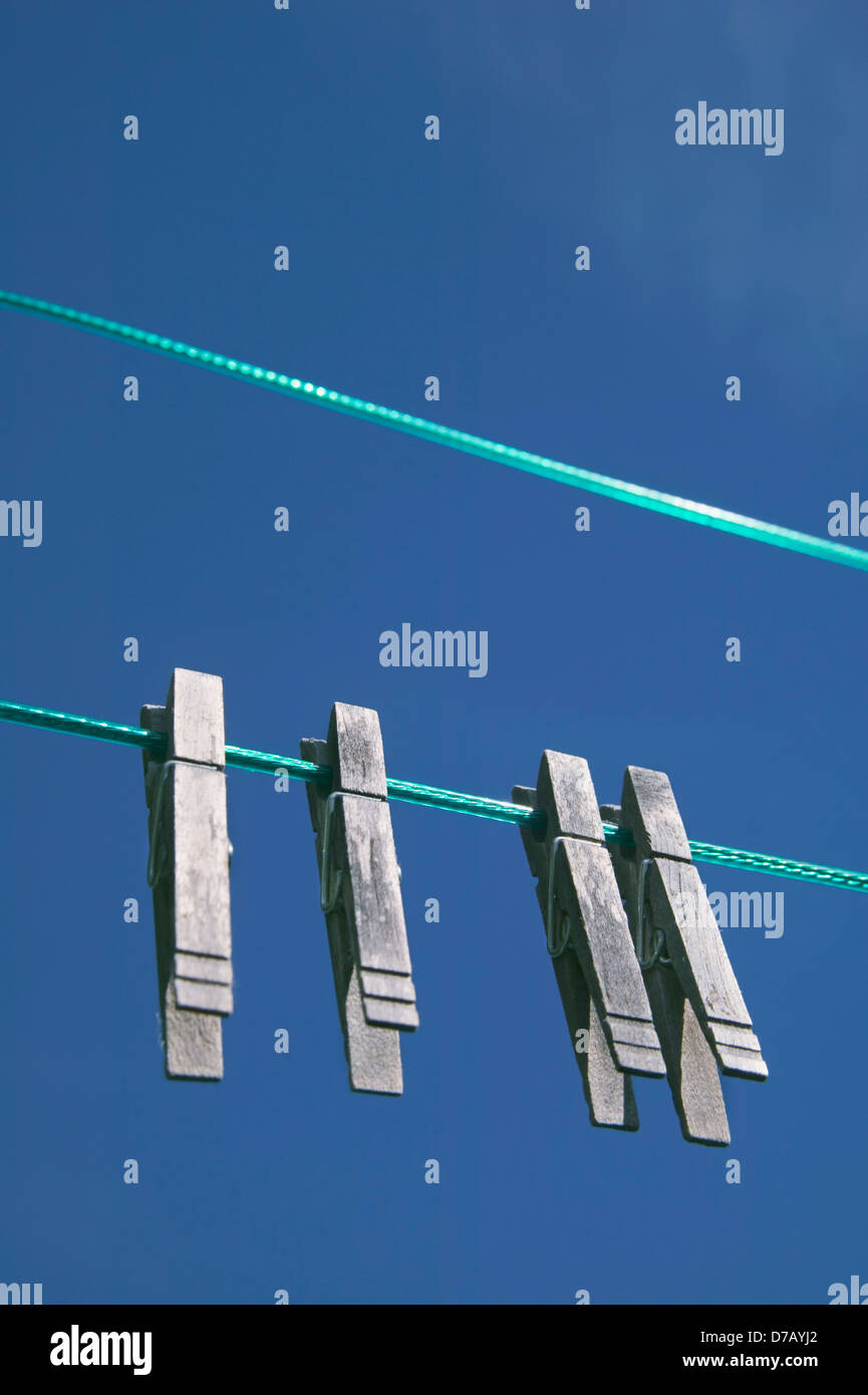 Clothes pegs on a clothesline; ontario canada Stock Photo - Alamy