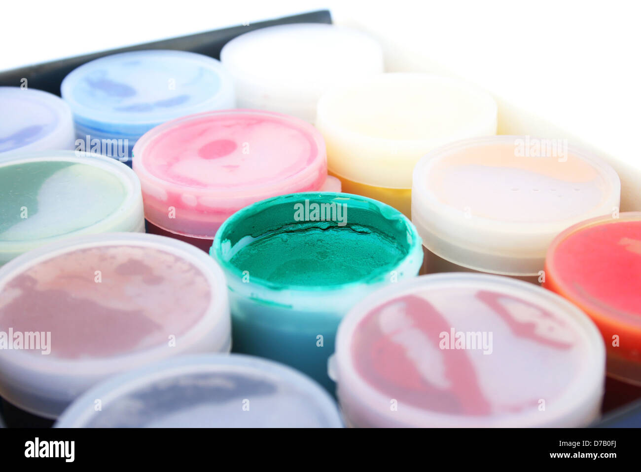 Colorful paint buckets on white background Stock Photo - Alamy