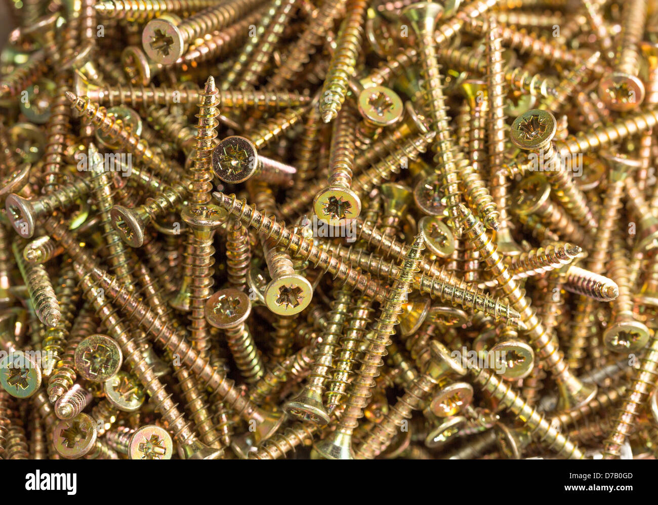 Golden screw hi-res stock photography and images - Alamy