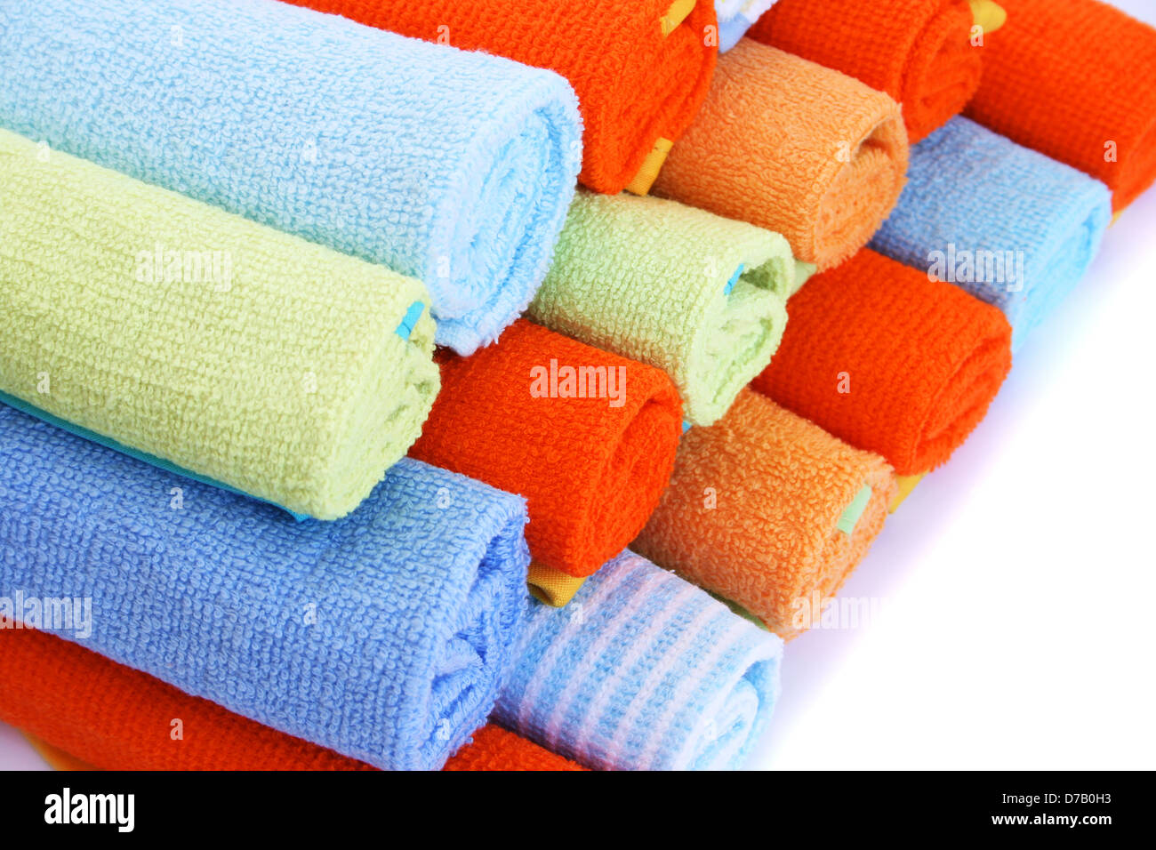 Colorful towels on white background Stock Photo - Alamy