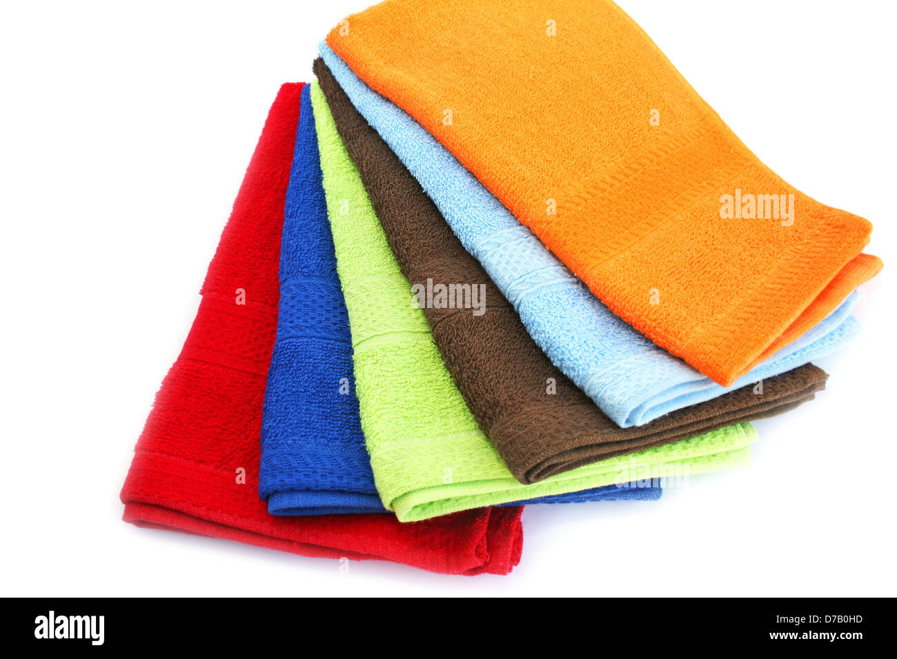 Colorful towels on white background Stock Photo - Alamy