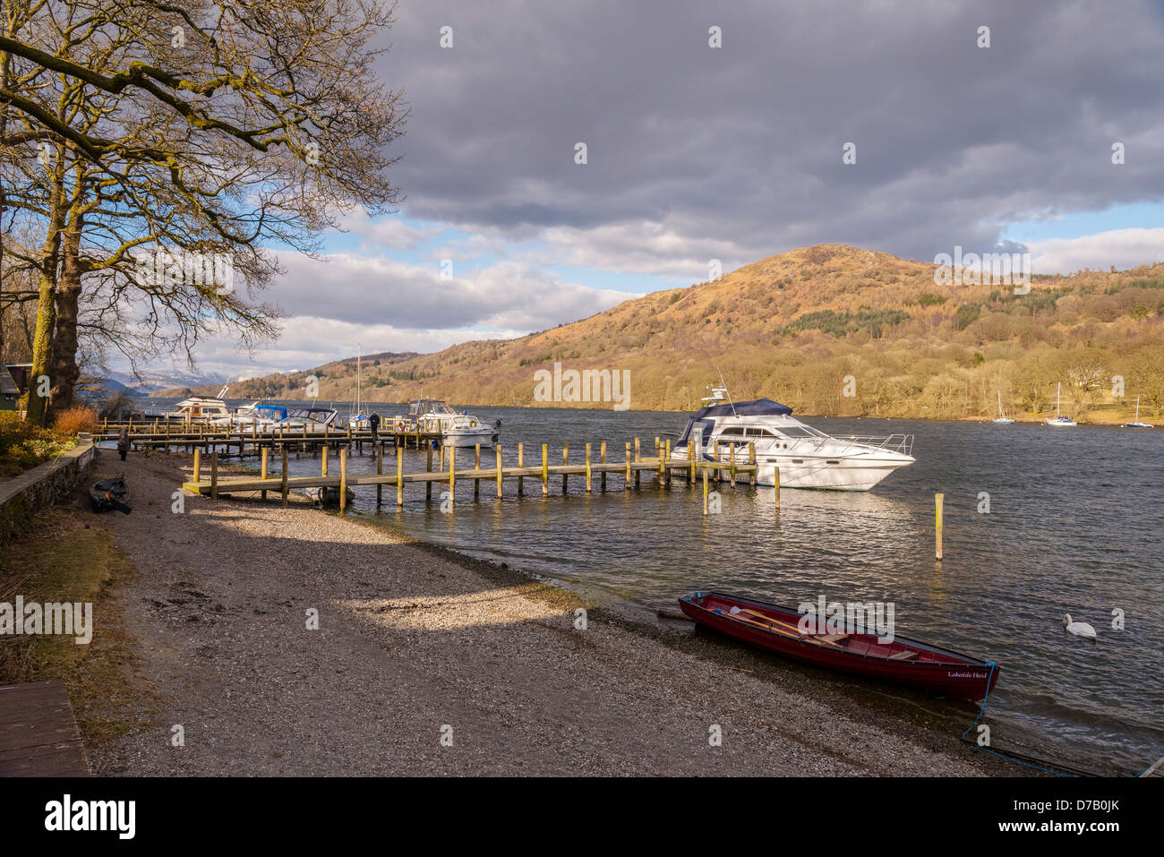 Evening sunshine on the jetties at Lakeside on Lake Windermere with ...