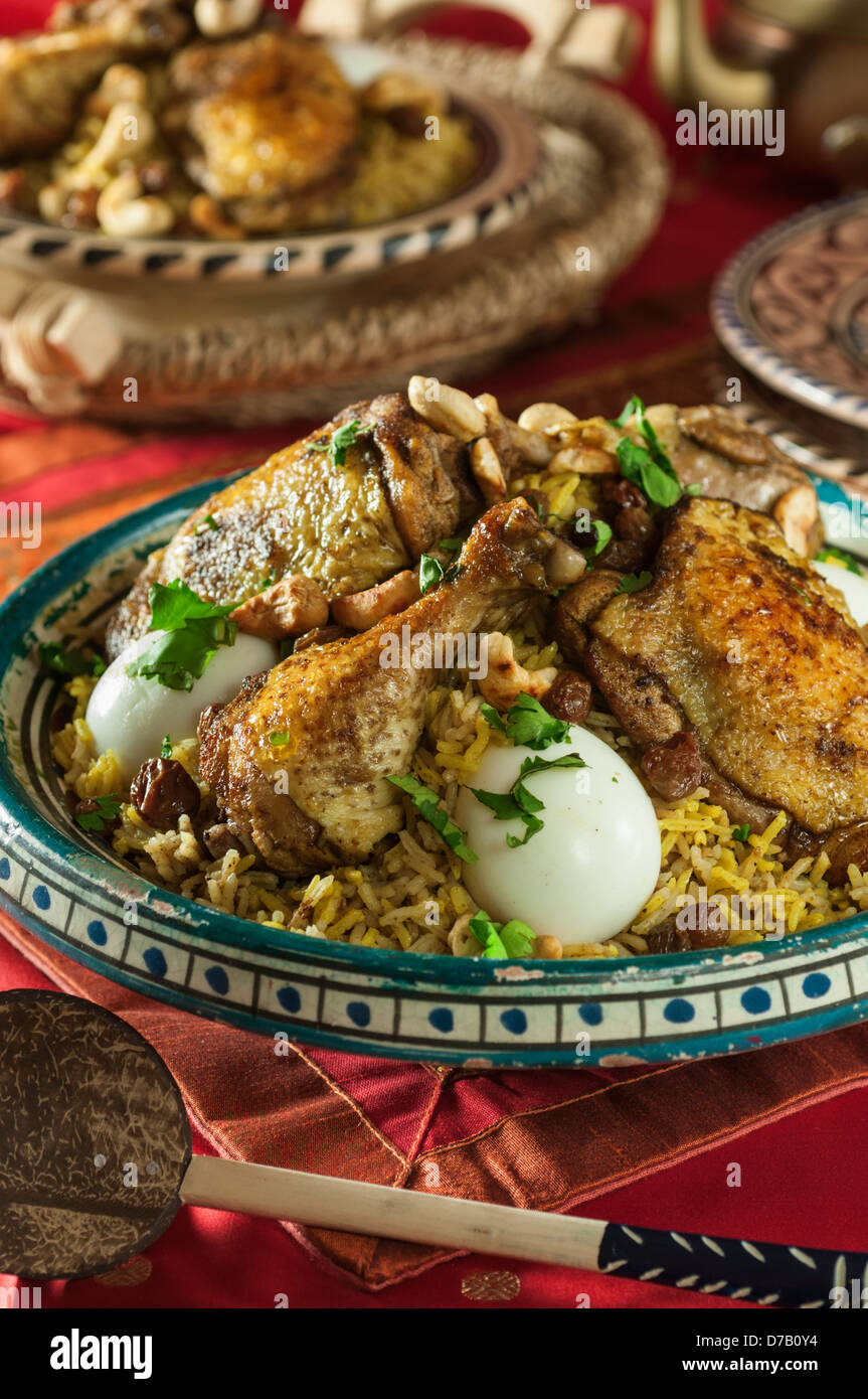 Kabsa chicken Chicken and rice dish Middle East Food Stock Photo - Alamy