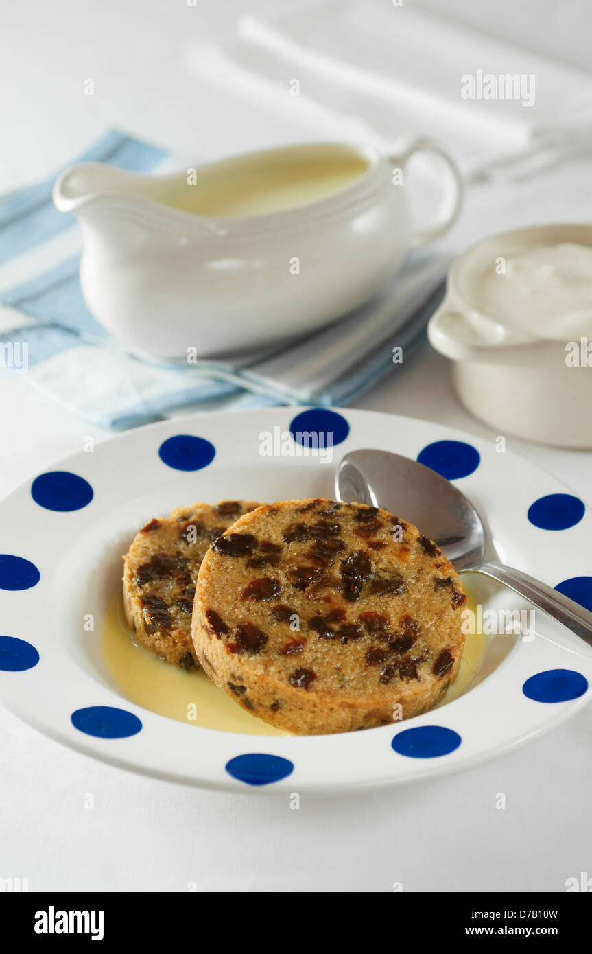Spotted Dick Steamed fruit pudding Traditional dessert UK Stock Photo ...